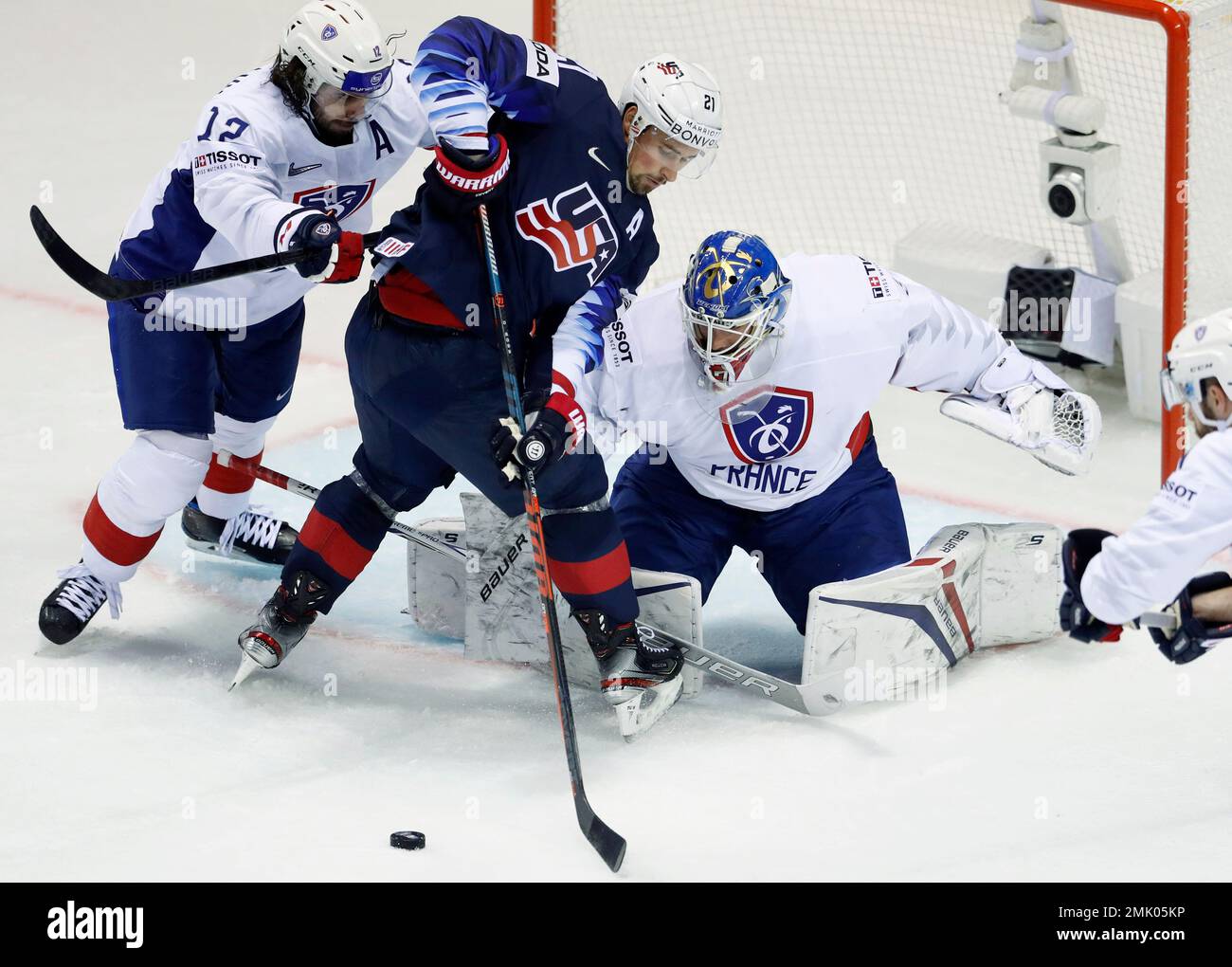 Sebastian Ylonen of France, right, and Valentin Claireaux of France, left, challenge Dylan ...