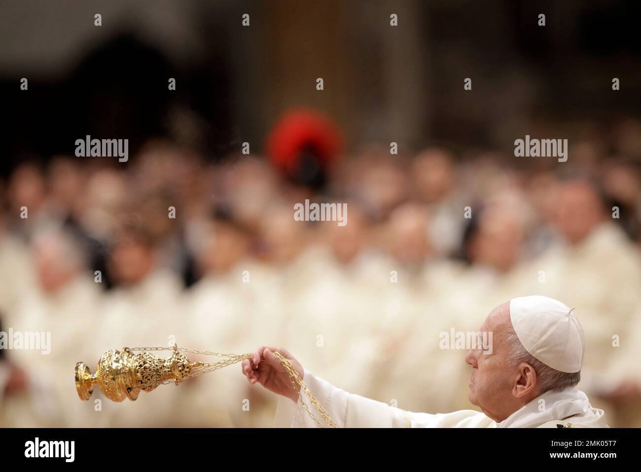 Pope Francis asperges incense during a ceremony in which he ordained ...