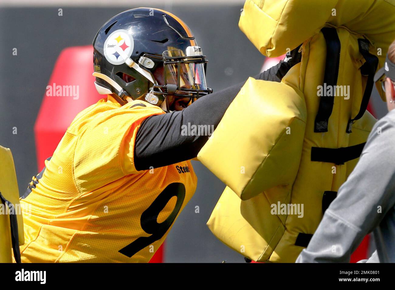 Pittsburgh Steelers defensive end Isaiah Buggs hits the blocking sled ...