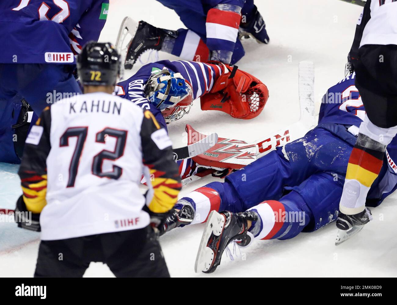 Great Britain's goaltender Ben Bowns, center, makes a save during the ...