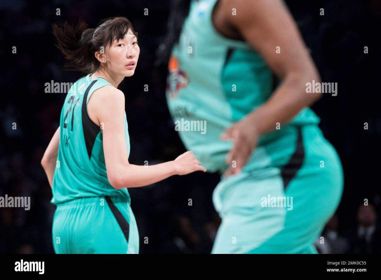 New York Liberty center Han Xu runs up court during the first half of a ...