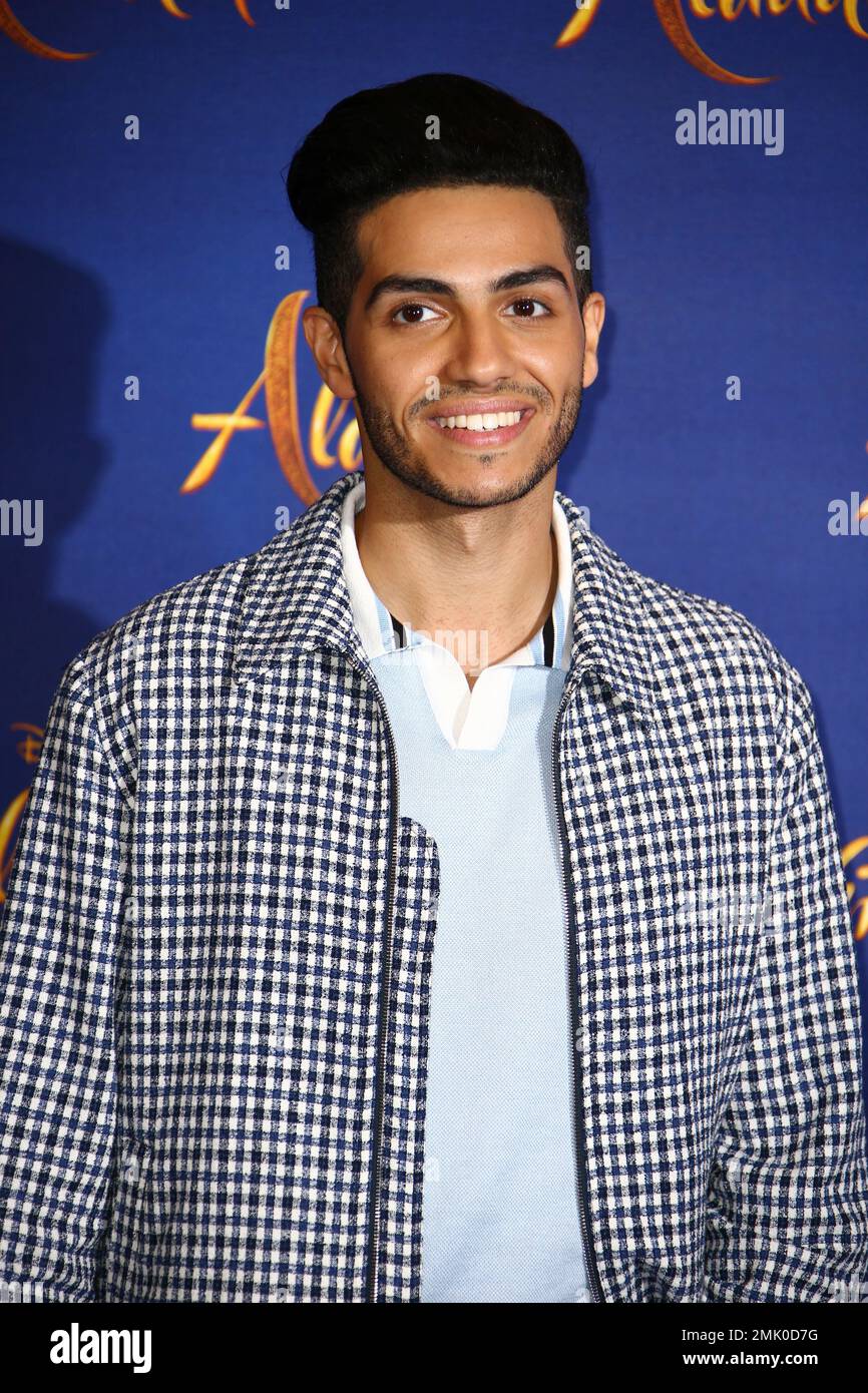 Actor Mena Massoud poses for photographers at the photo call for the ...