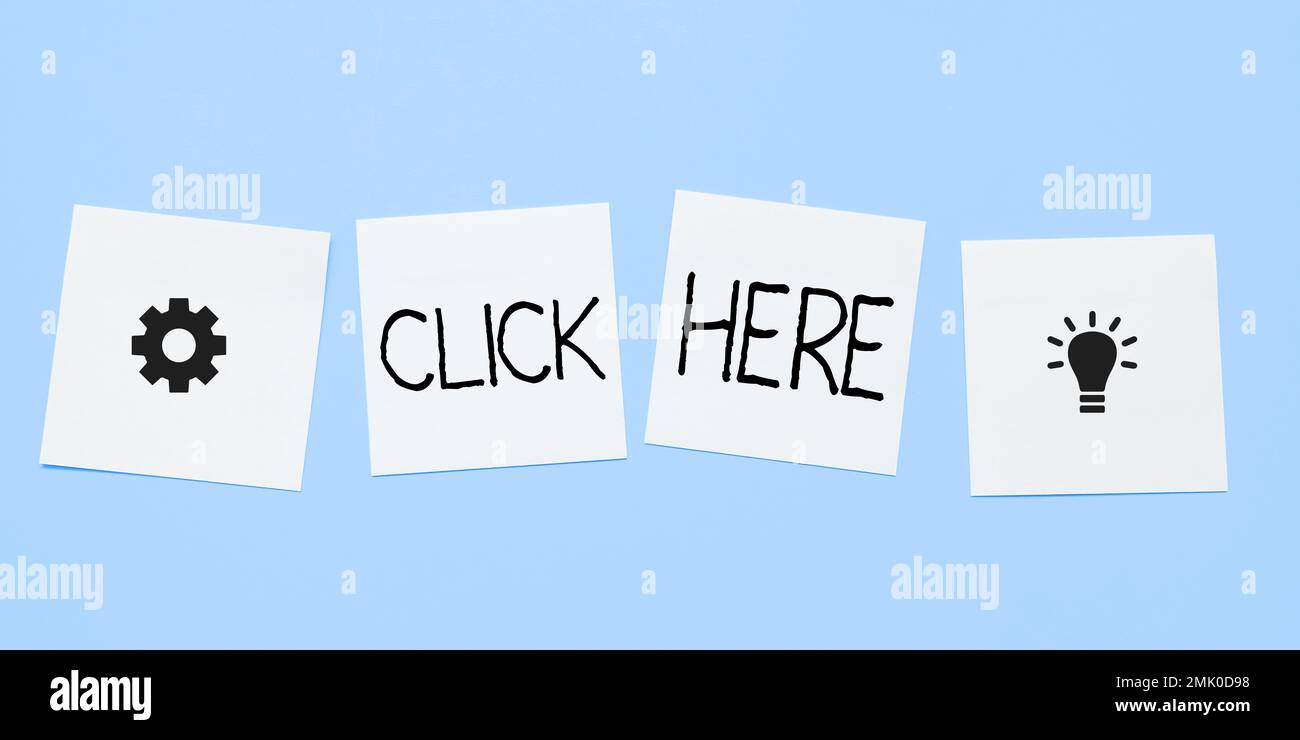 Hand writing sign Click Here. Business idea carry out a computer ...