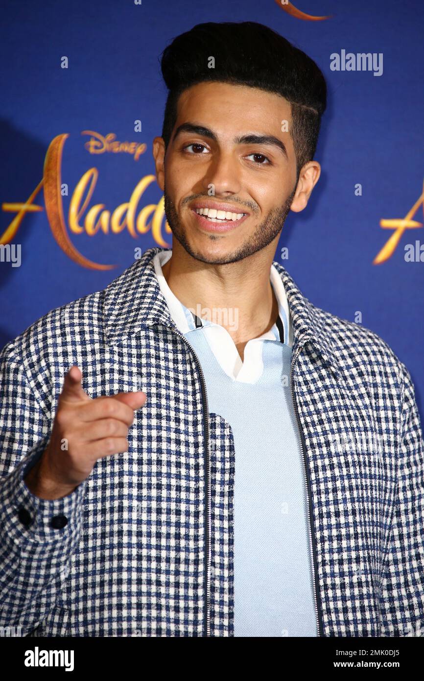 Actor Mena Massoud poses for photographers at the photo call for the ...