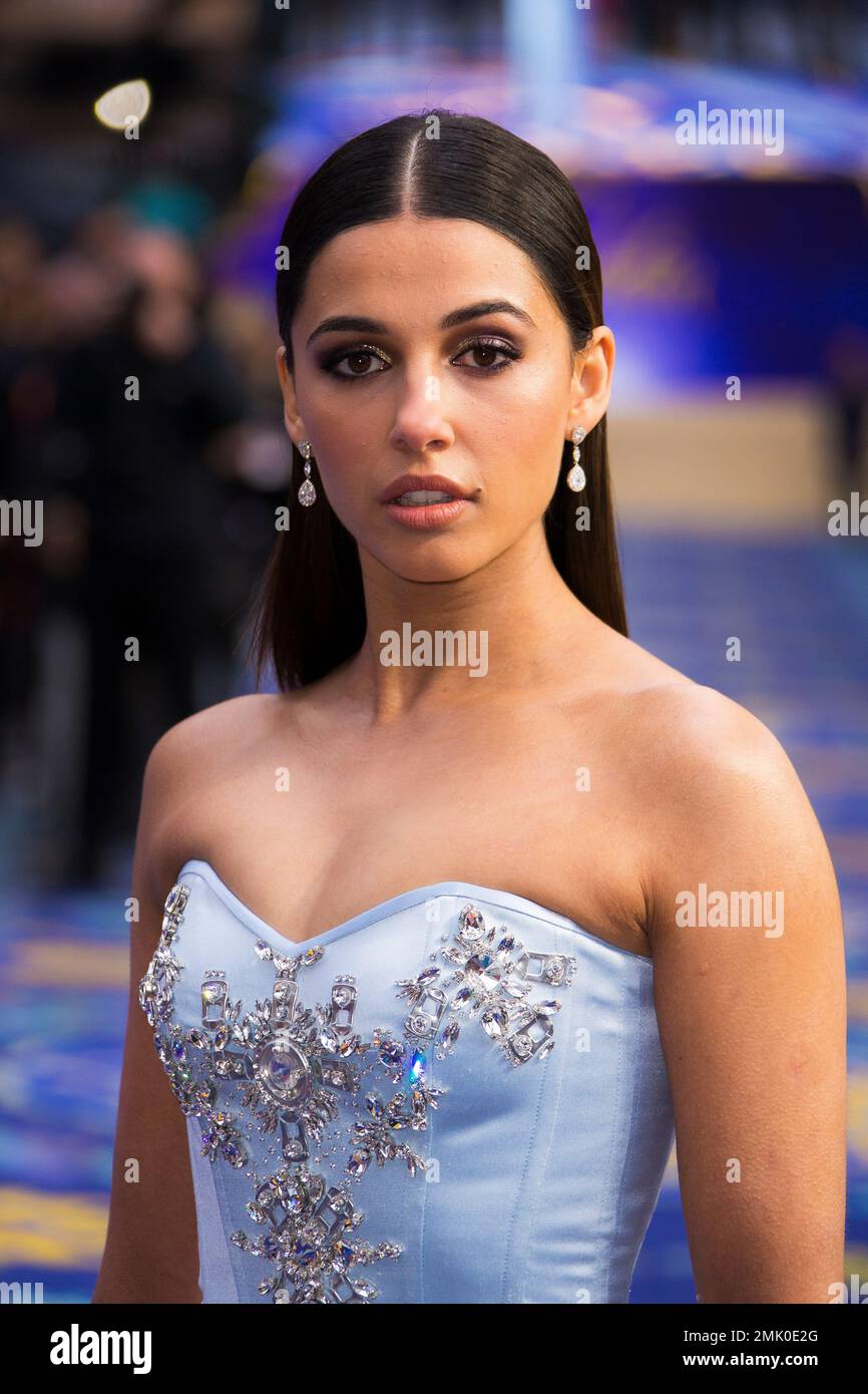 Actress Naomi Scott poses for photographers upon arrival at the ...