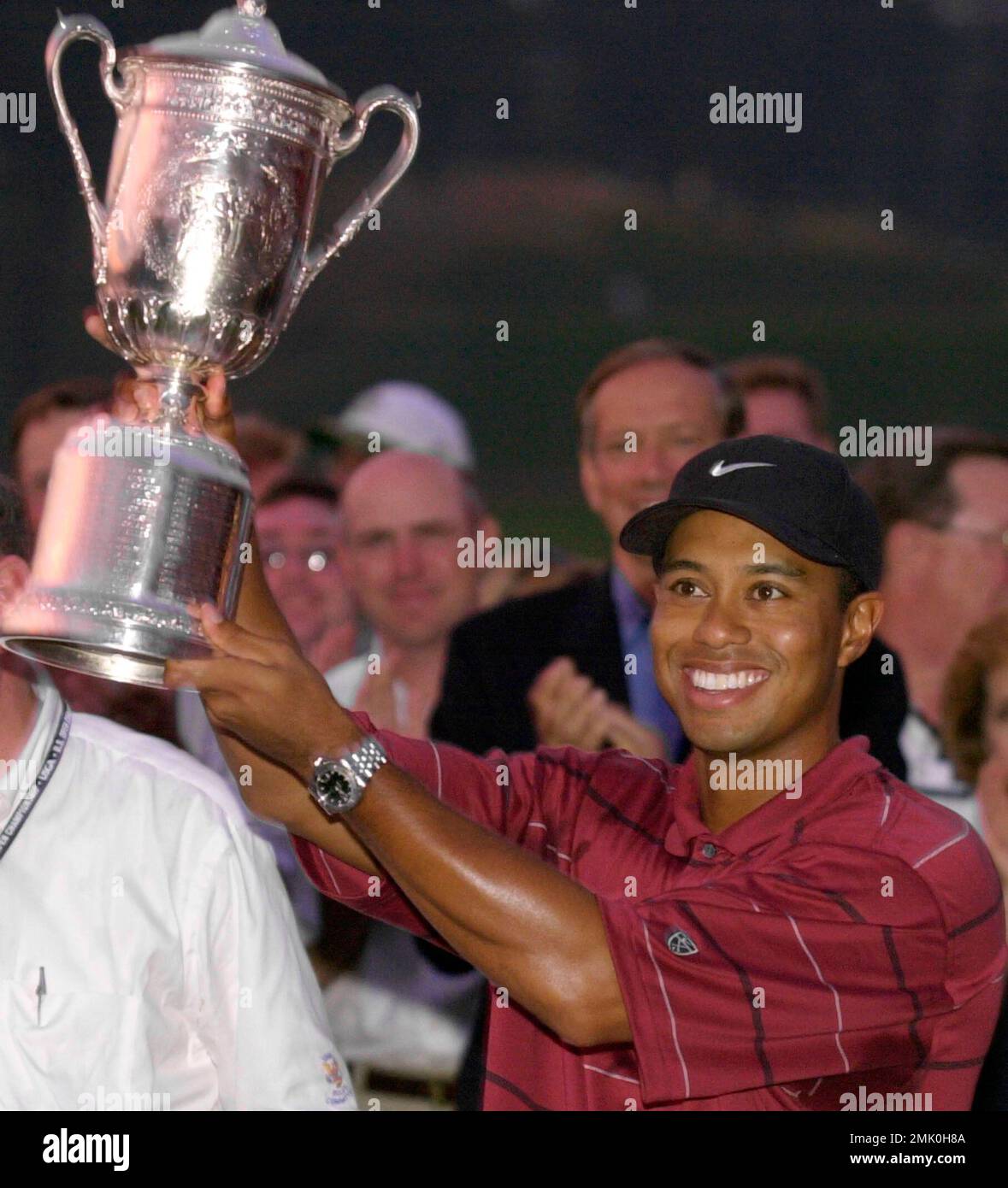 FILE - In this June 16, 2002, file photo, Tiger Woods holds the 2002 U ...