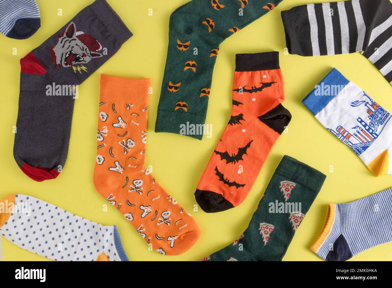 Socks pattern closeup. Bright cheerful sock without a pair top view. A ...