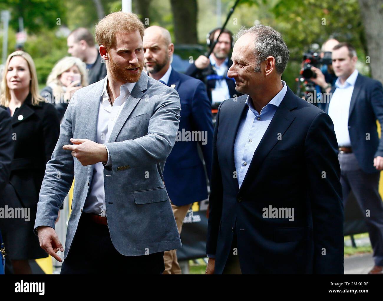 Britain's Prince Harry arrives with retired Lt Gen. Mart de Kruif ...