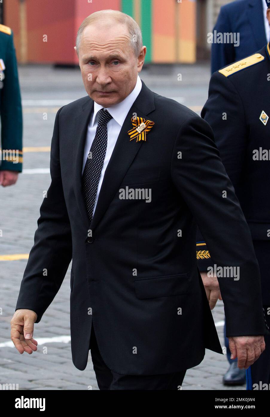 Russian President Vladimir Putin leaves Red Square after the Victory ...