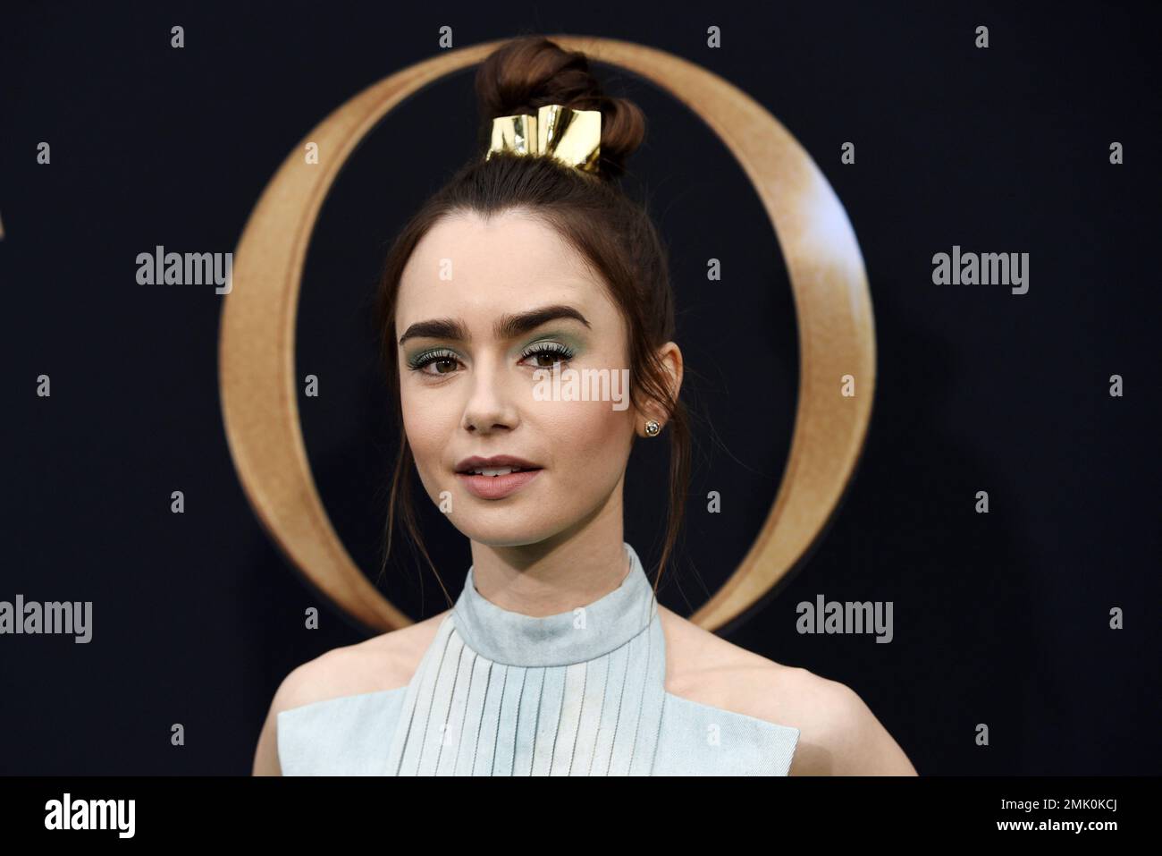 Lily Collins, a cast member in "Tolkien," poses at the premiere of the ...