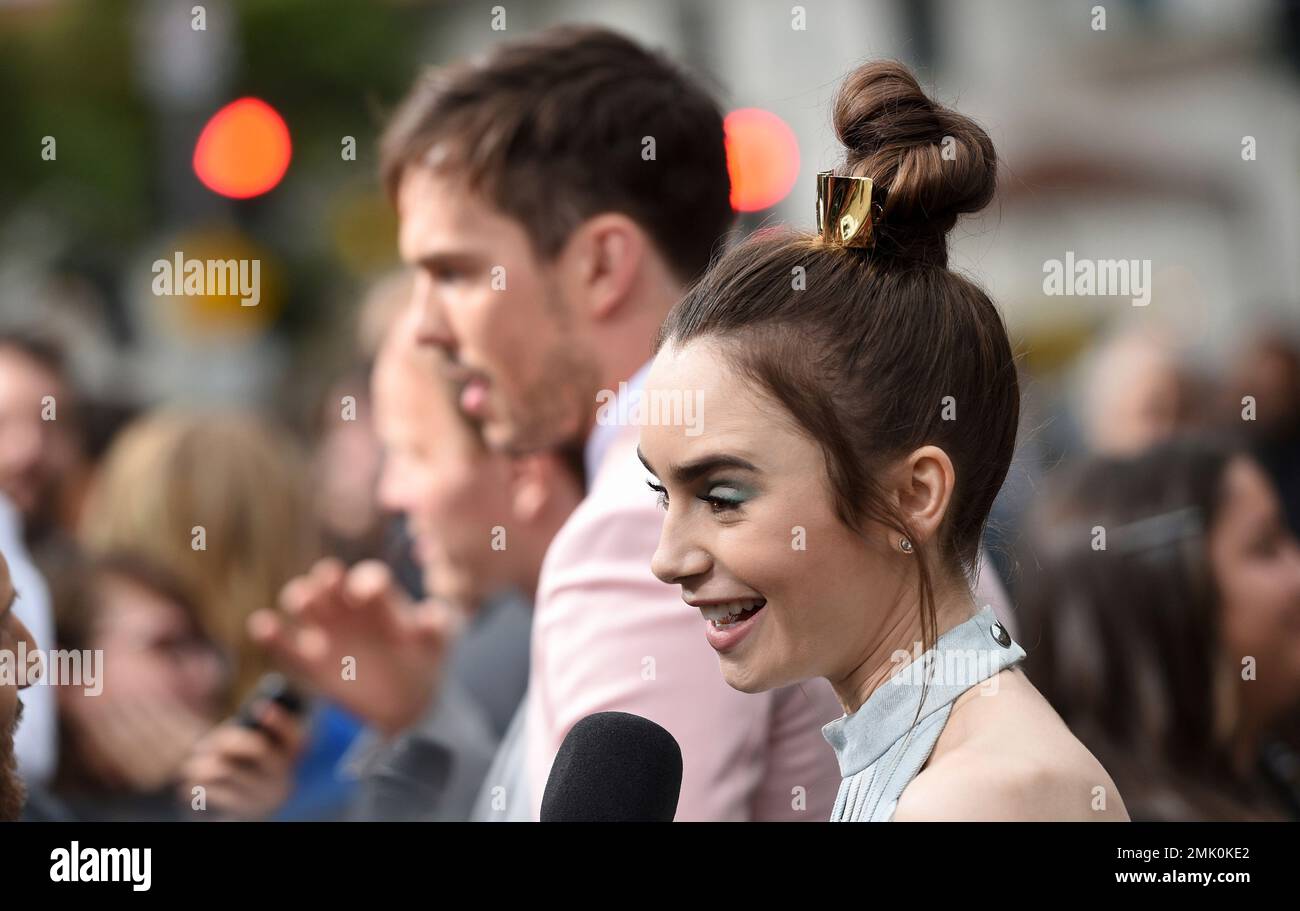 Lily Collins, a cast member in "Tolkien," is interviewed at the ...