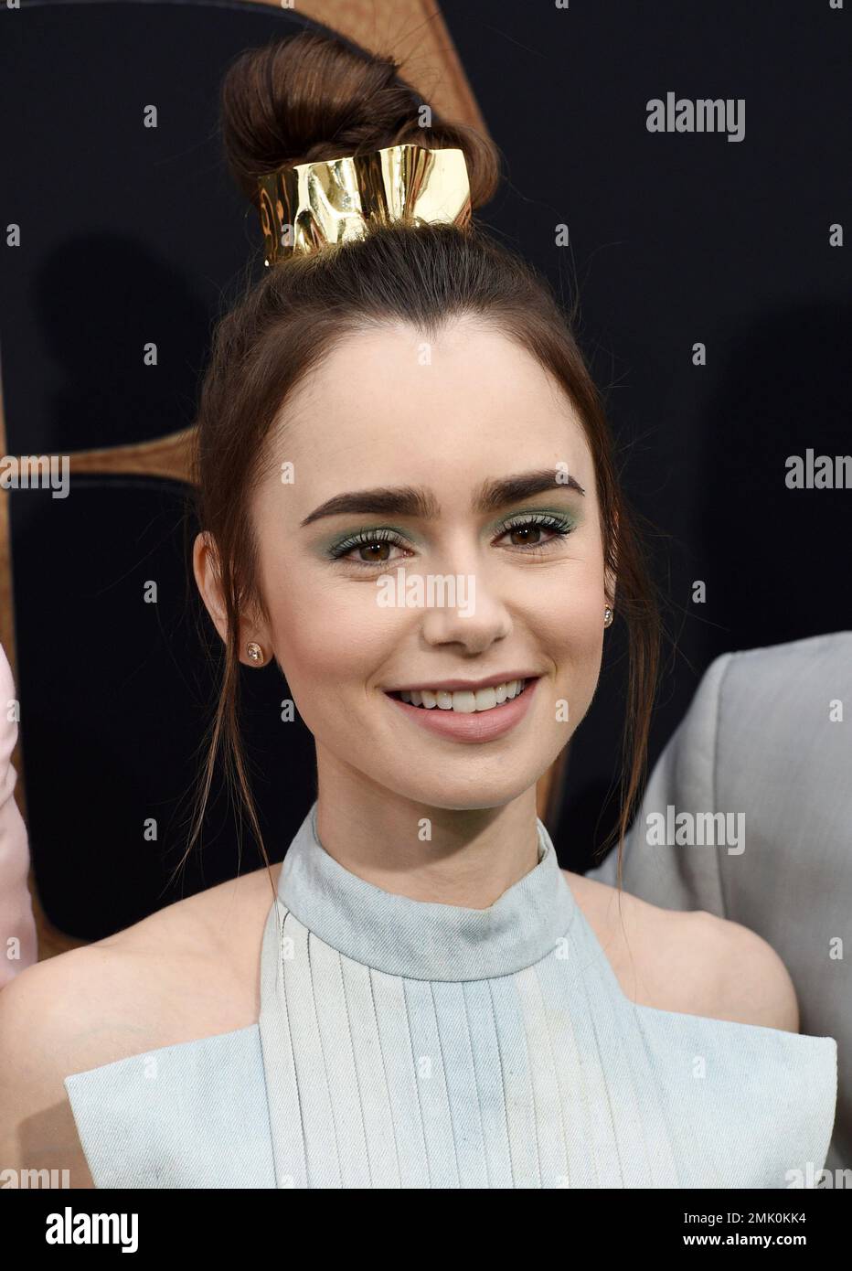 Lily Collins, a cast member in "Tolkien," poses at the premiere of the ...