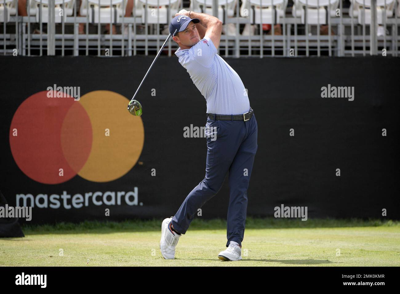 Sam Saunders watches his tee shot on the first hole during the third ...