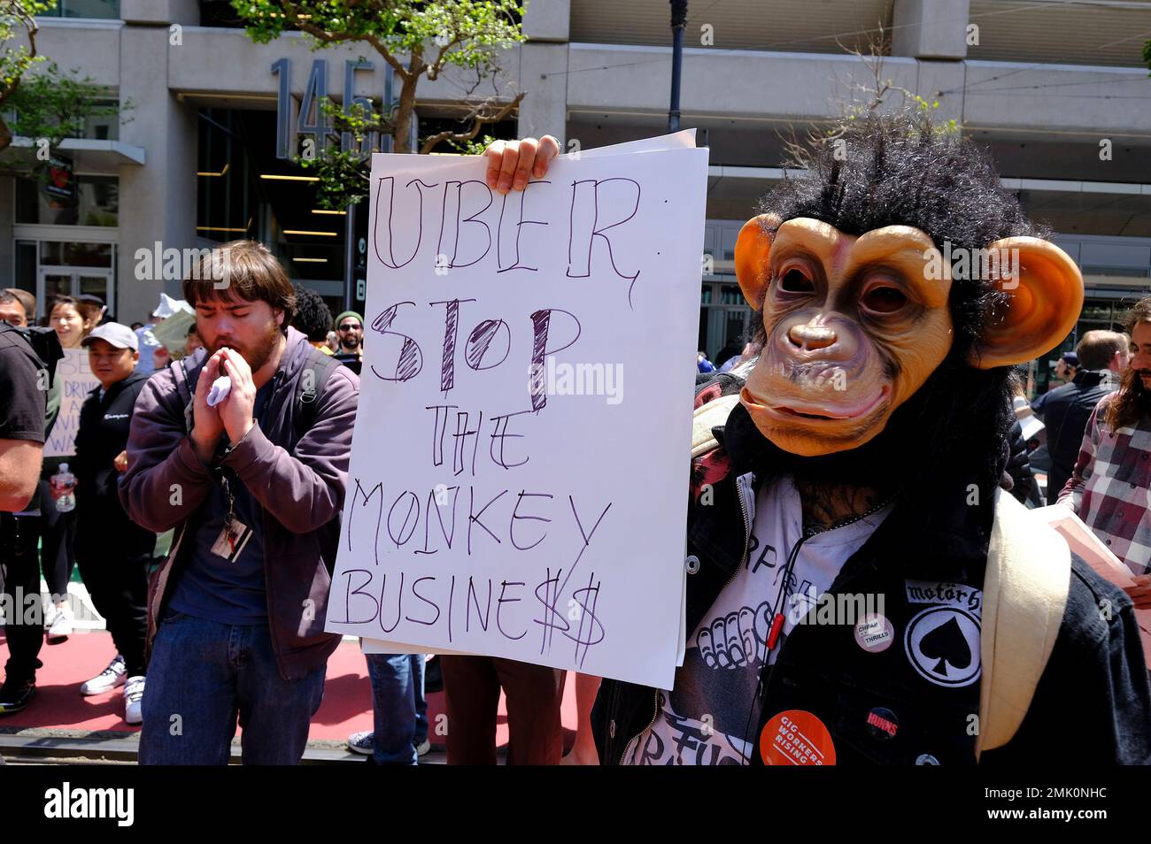 Protesters hold a rally and stop traffic on Market Street outside of ...