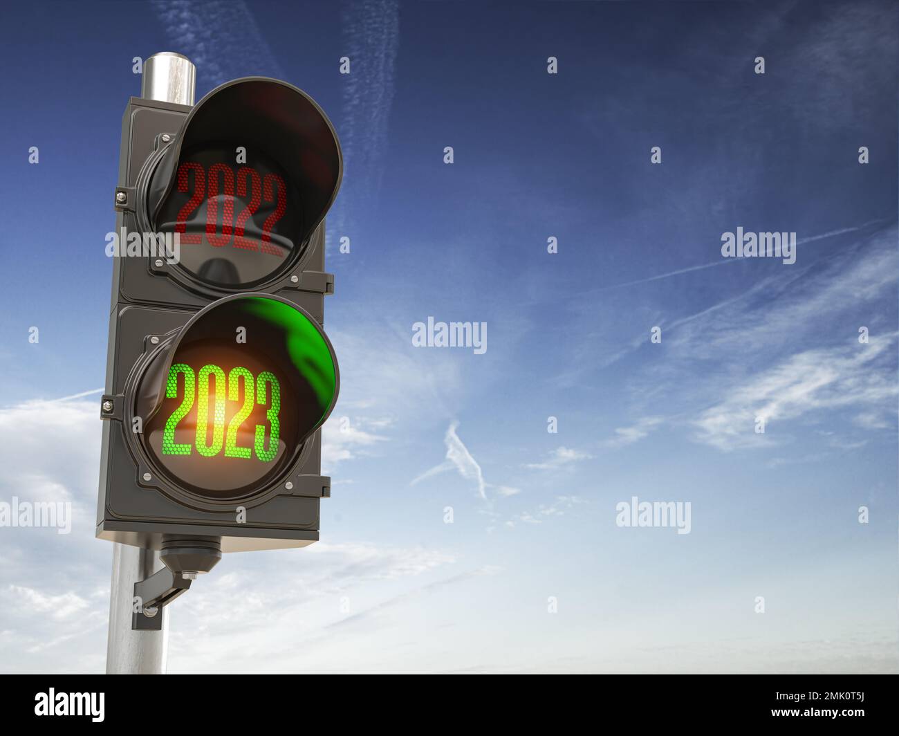 Traffic light with green light 2023 and red 2022 on sky background ...