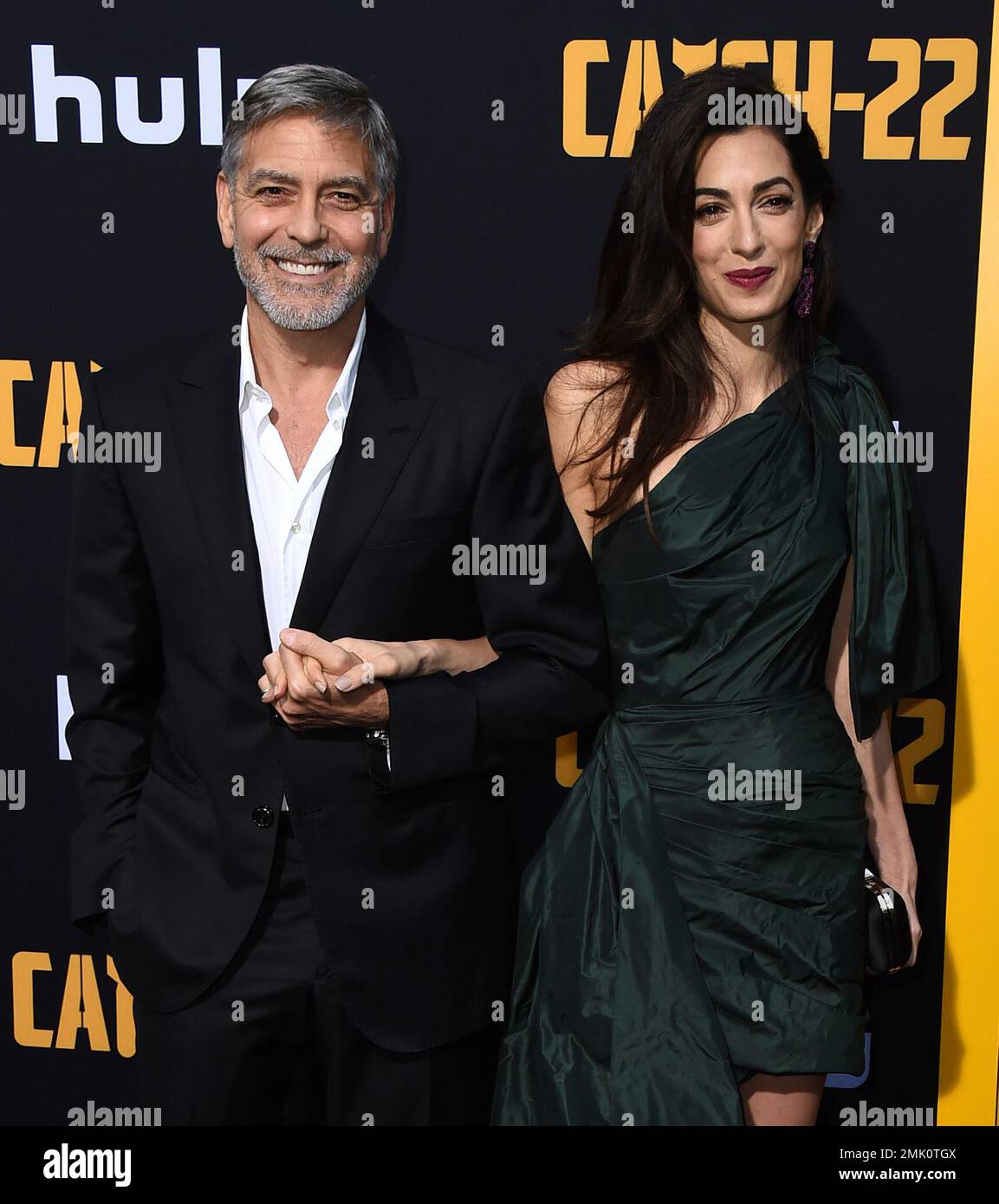 George Clooney and Amal Clooney arrive at the Los Angeles premiere of "Catch-22" at TCL Chinese ...