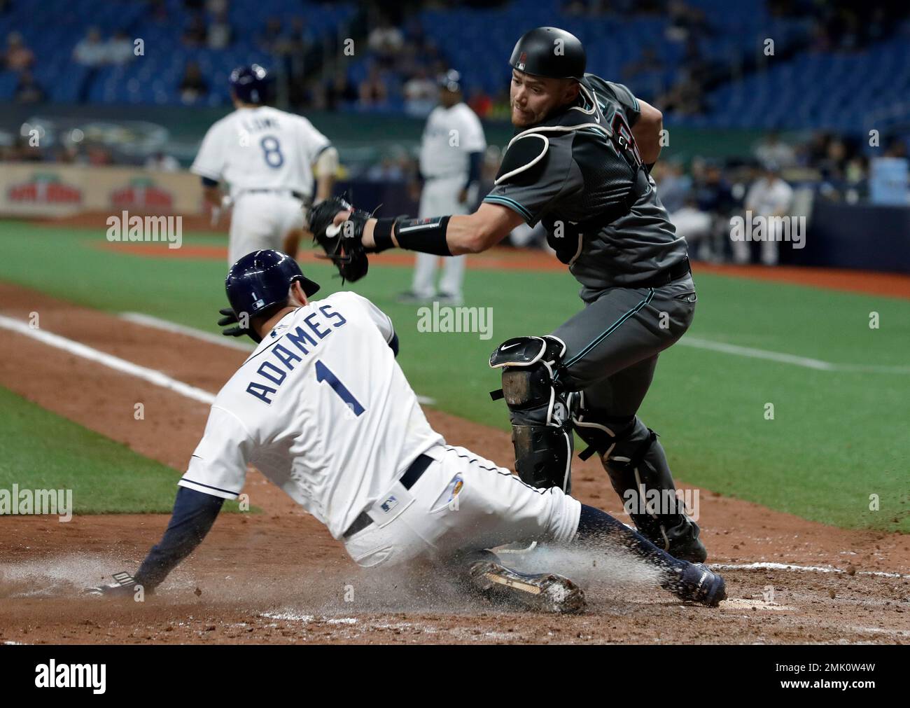 Tampa Bay Rays' Willy Adames (1) scores ahead of the tag by Arizona ...