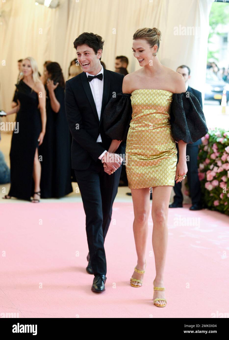 Joshua Kushner, left, and wife Karlie Kloss arrive at The Metropolitan ...