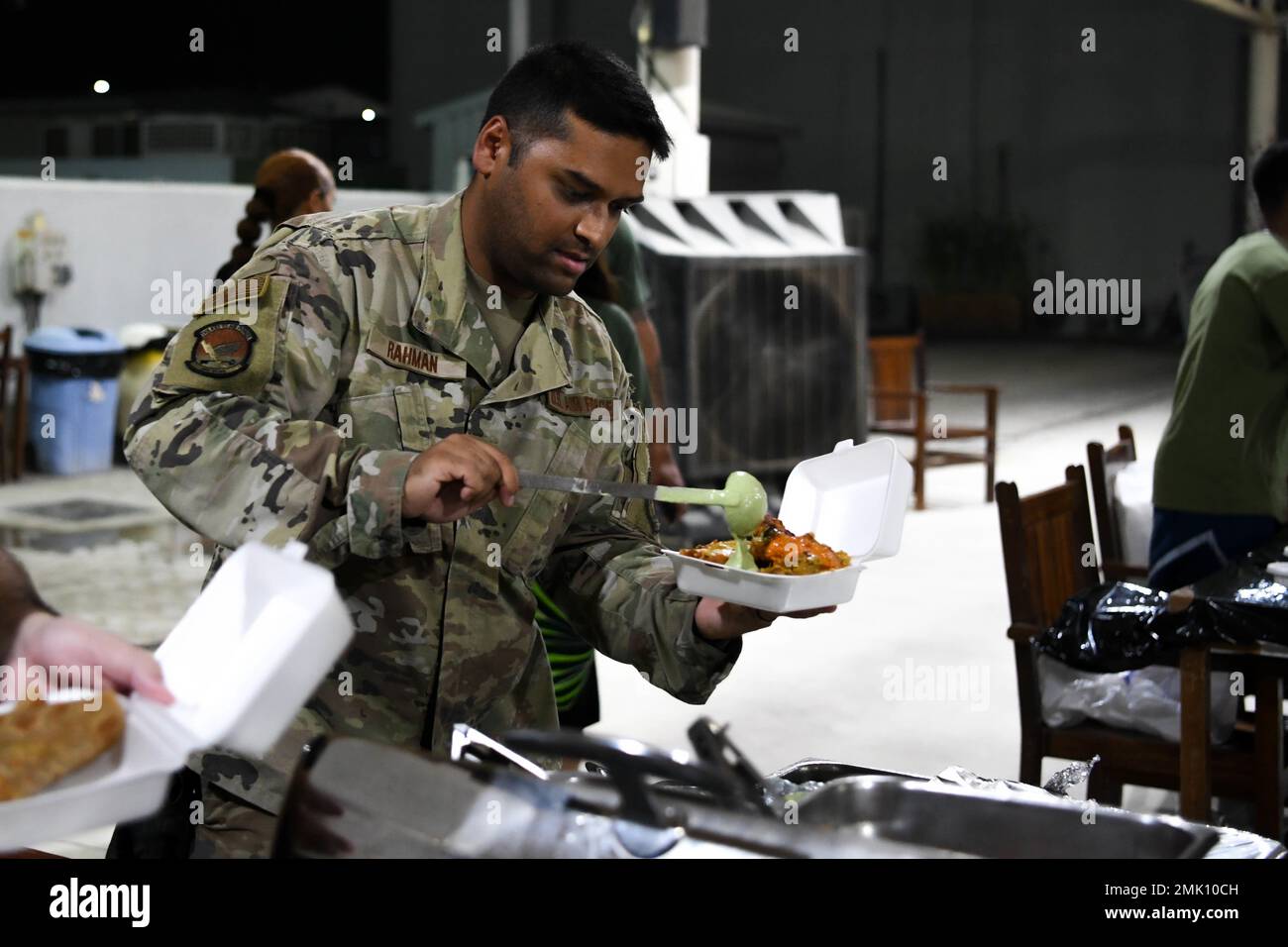 Staff Sgt. Rayan Rahman, a ramp operations supervisor assigned to the ...