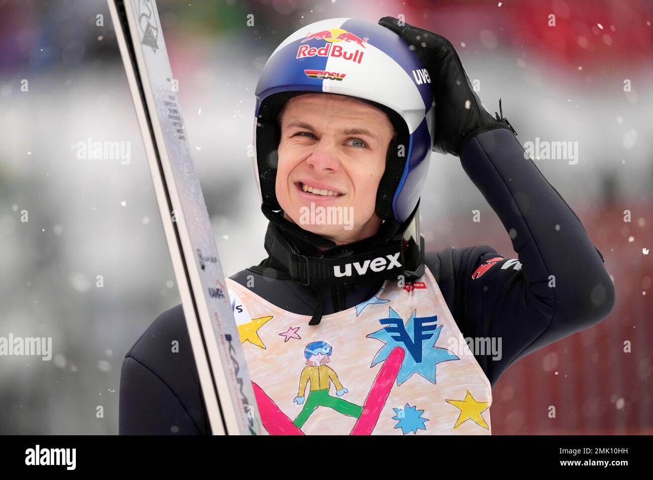 Andreas Wellinger, of Germany, reacts after his second round jump at ...