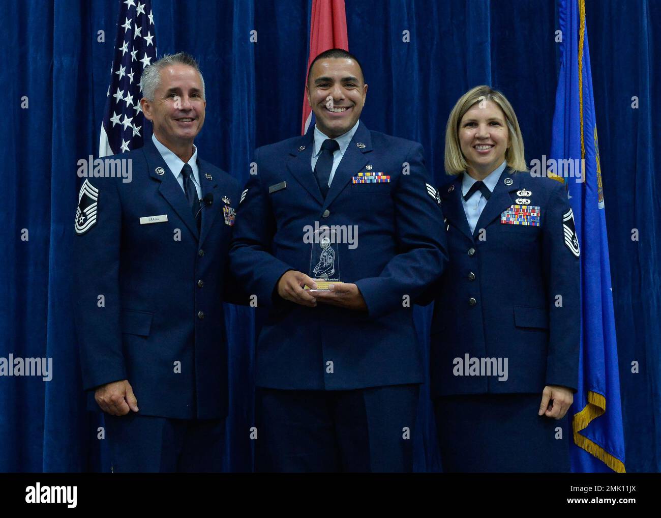 U.S. Air Force Senior Airman Joshua Montes receives the Commandant ...