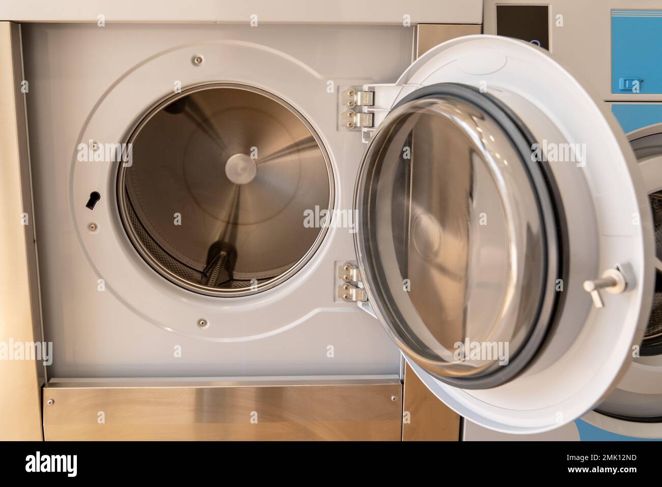 open basin door of a washing machine Stock Photo - Alamy