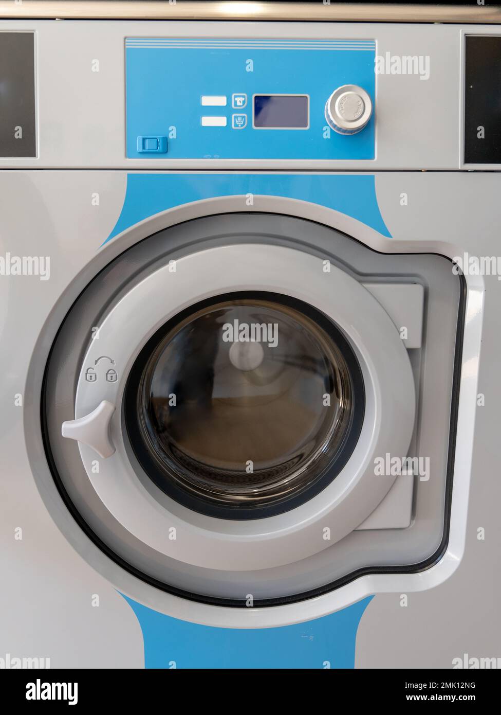 Washing machine industrial in laundry Stock Photo - Alamy