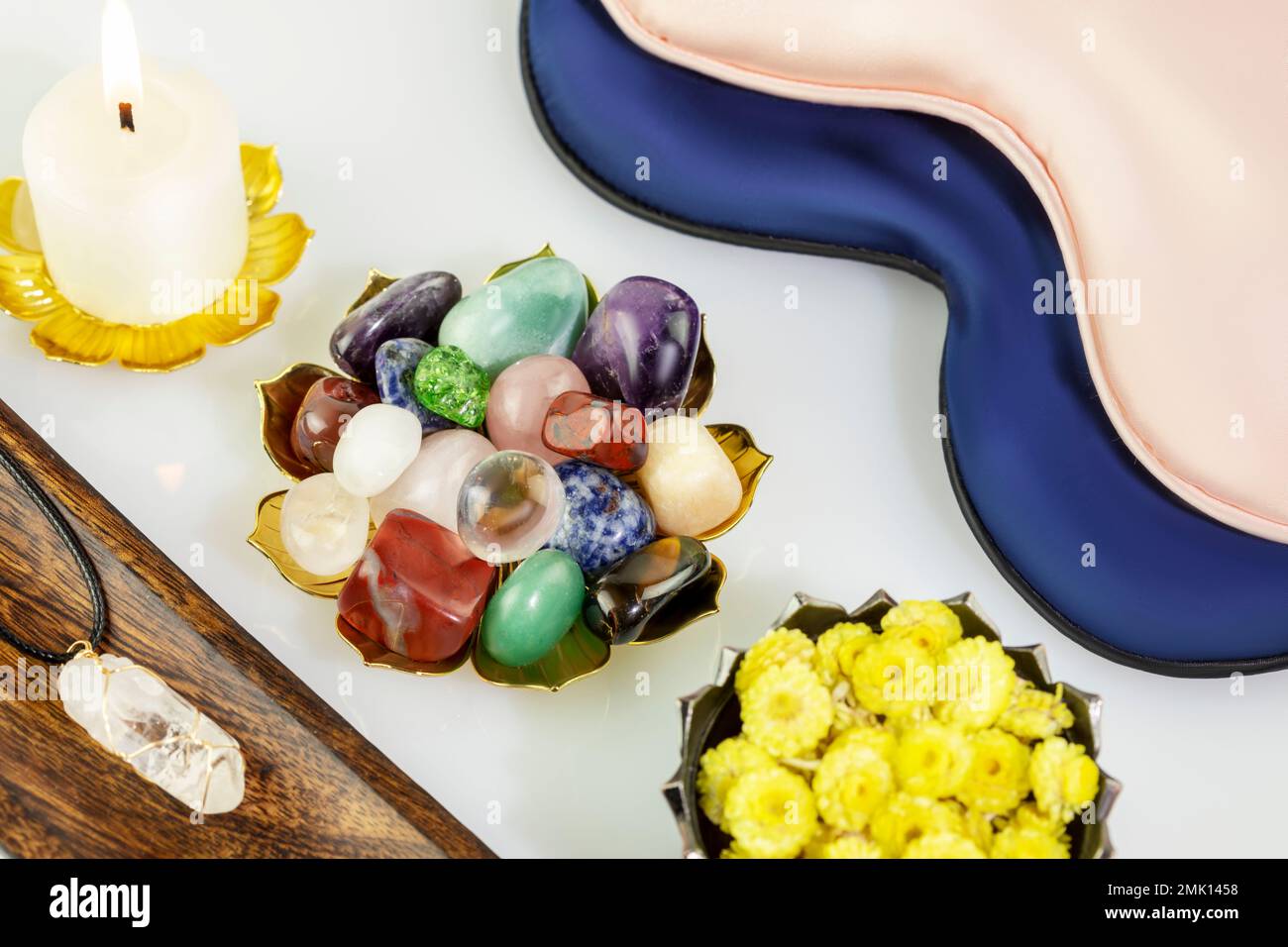 Relaxing ritual with crystals gemstones set, candle and sleep mask on ...