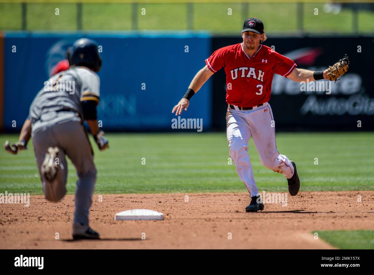 Utah second baseman Oliver Dunn fields during an NCAA college baseball ...