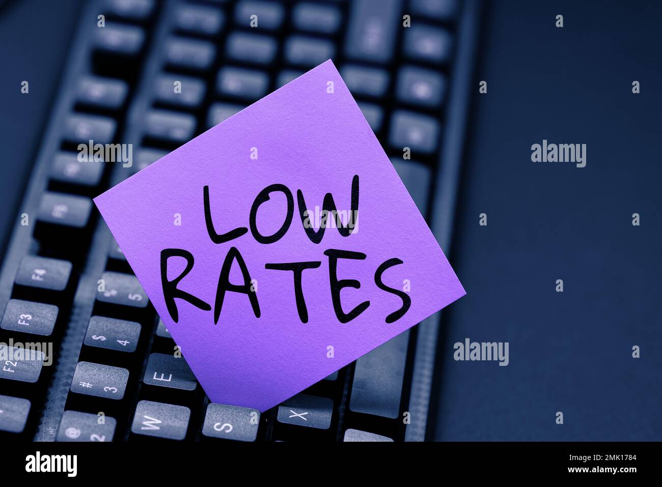 Hand writing sign Low Rates. Word Written on A cost of an item or ...