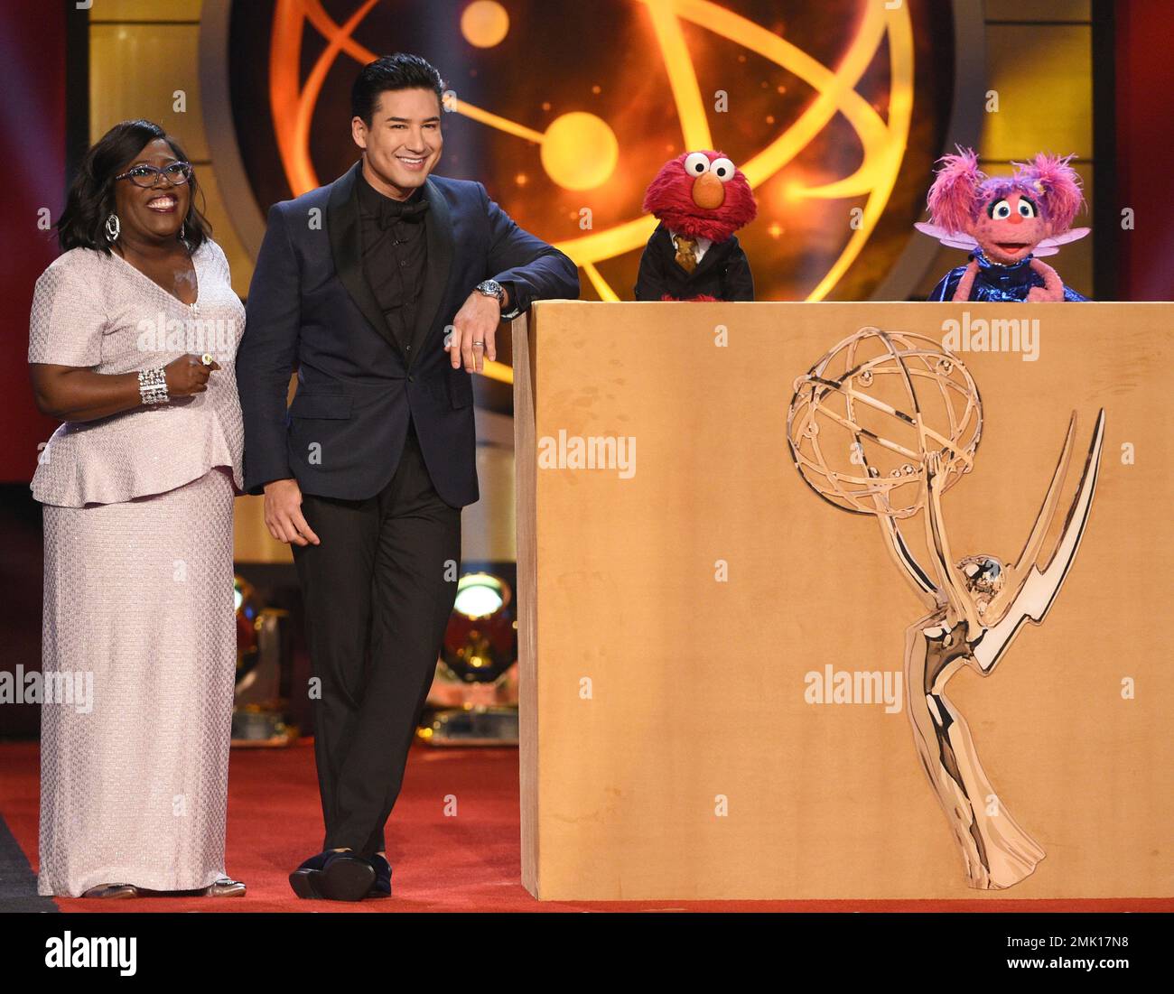 Hosts Sheryl Underwood, left, and Mario Lopez speak onstage with the ...