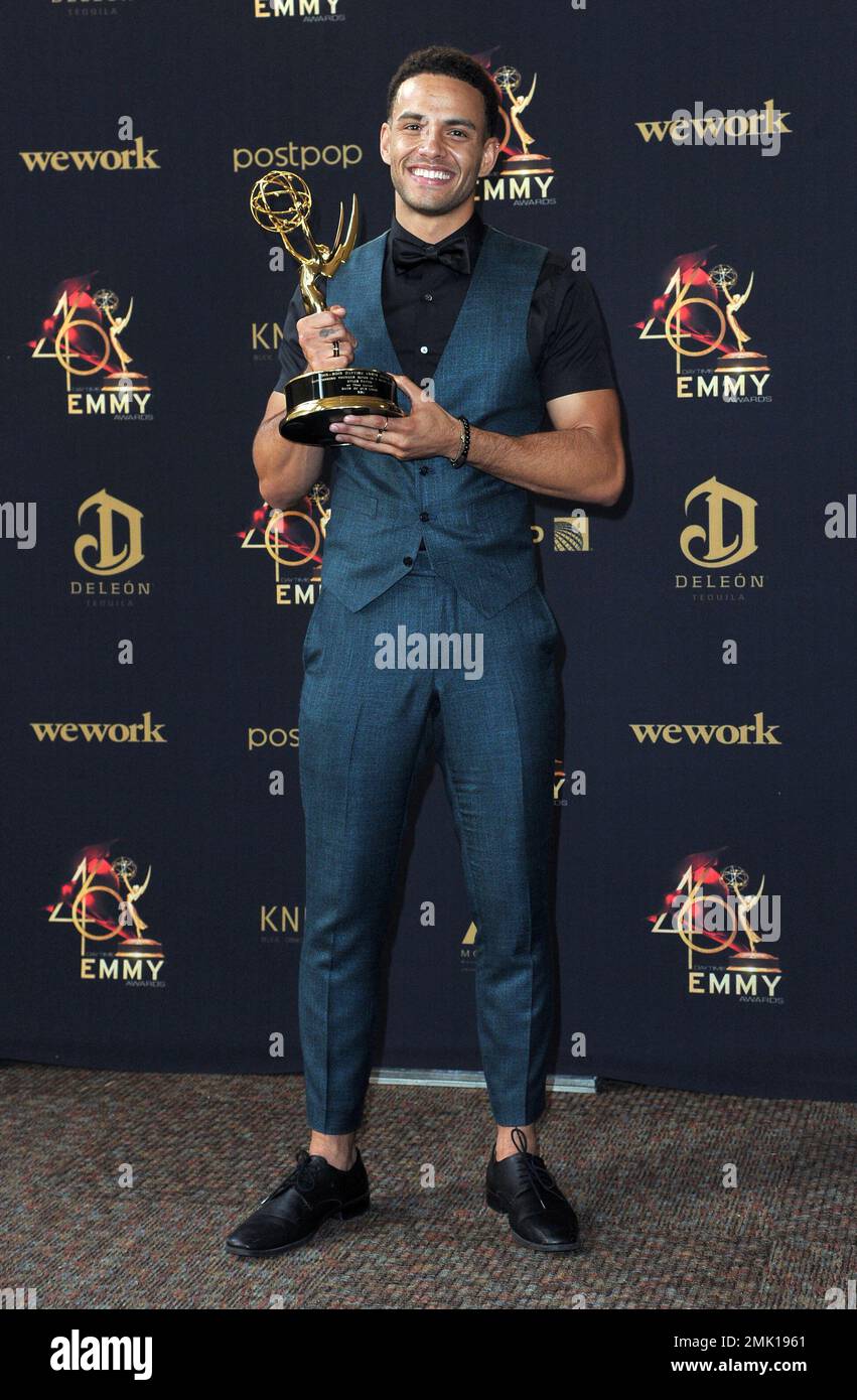 Kyler Pettis poses in the press room with the award for outstanding ...