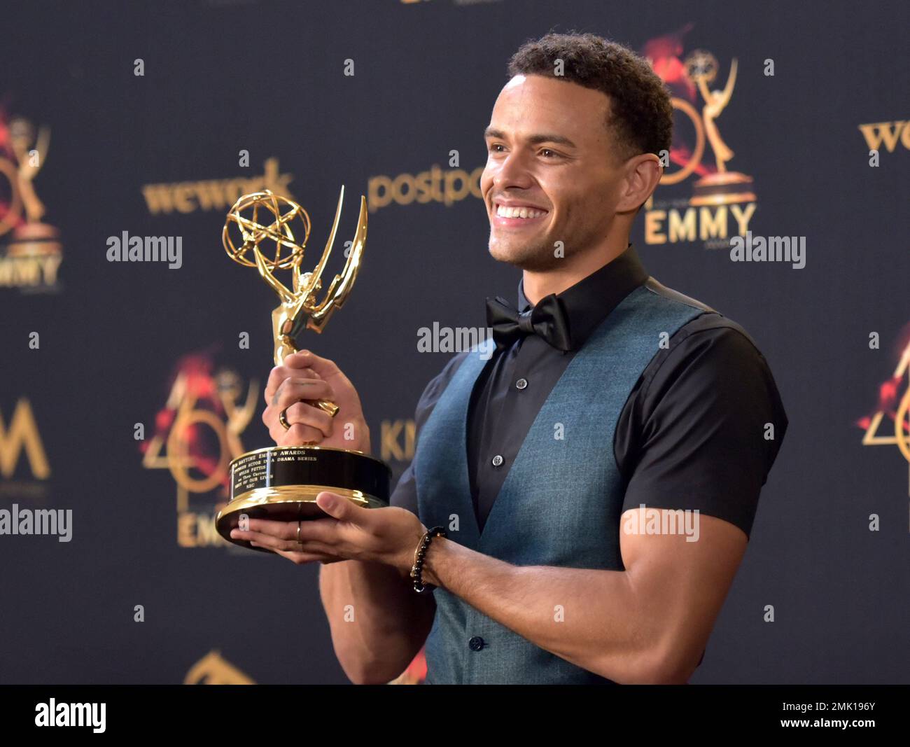 Kyler Pettis poses in the press room with the award for outstanding ...