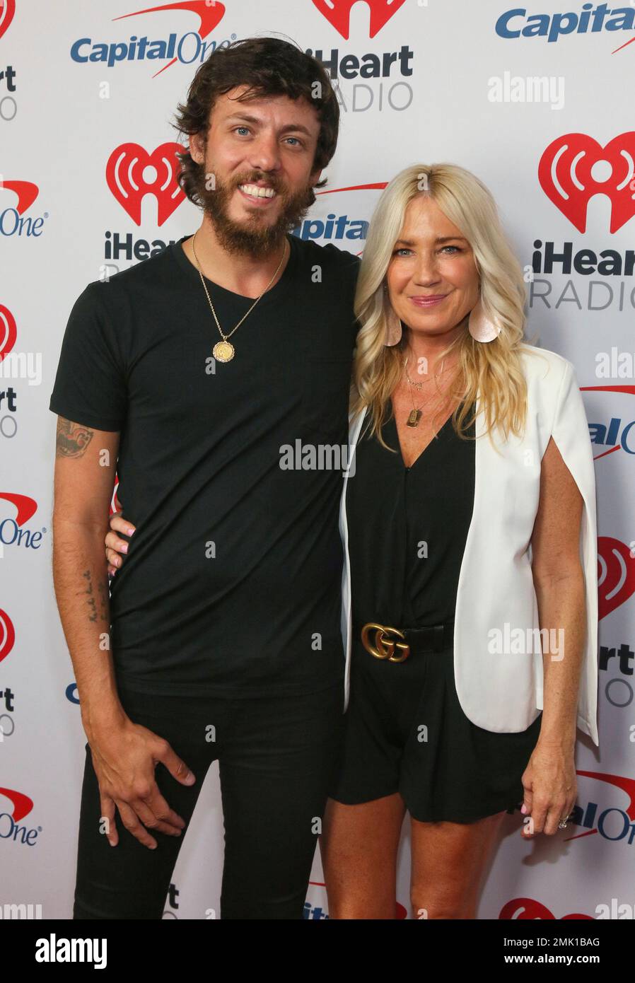 Chris Janson and his wife, Kelly Lynn, arrive at the iHeartCountry ...