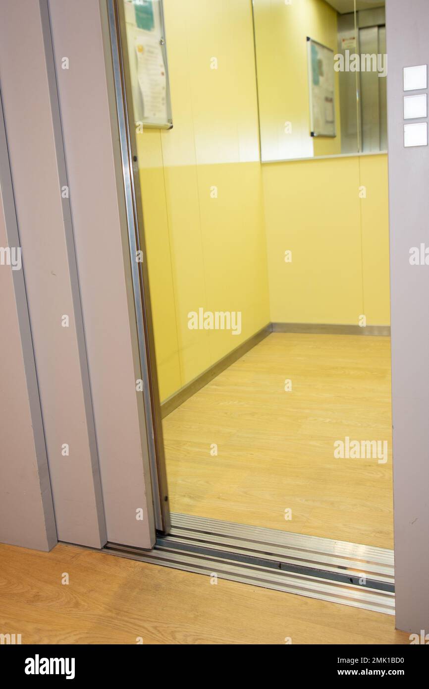 empty elevator cabin of the lift with buttons Stock Photo - Alamy