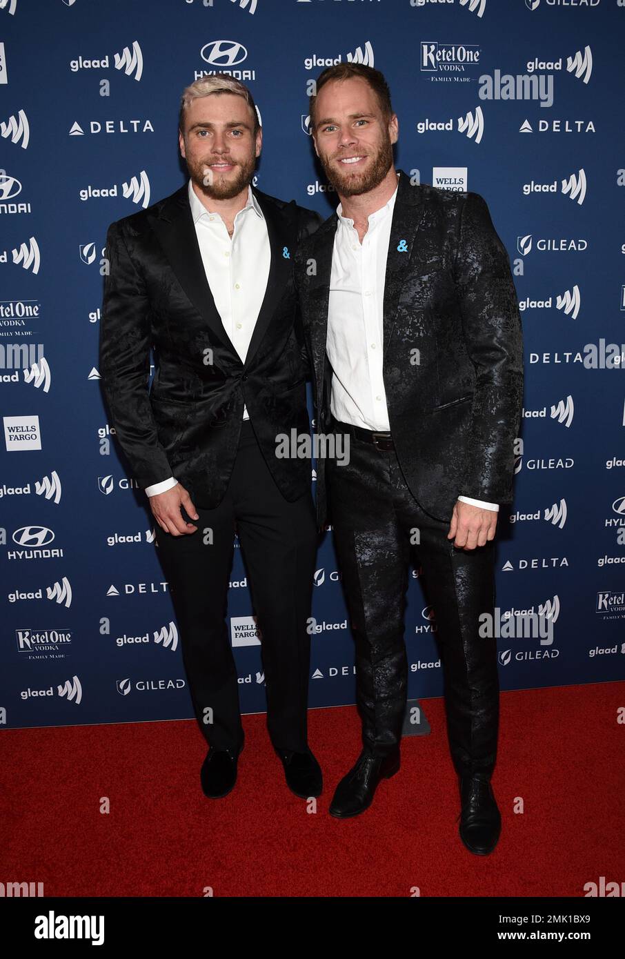 Gus Kenworthy, left, and Matthew Wilkas attend the 30th annual GLAAD ...