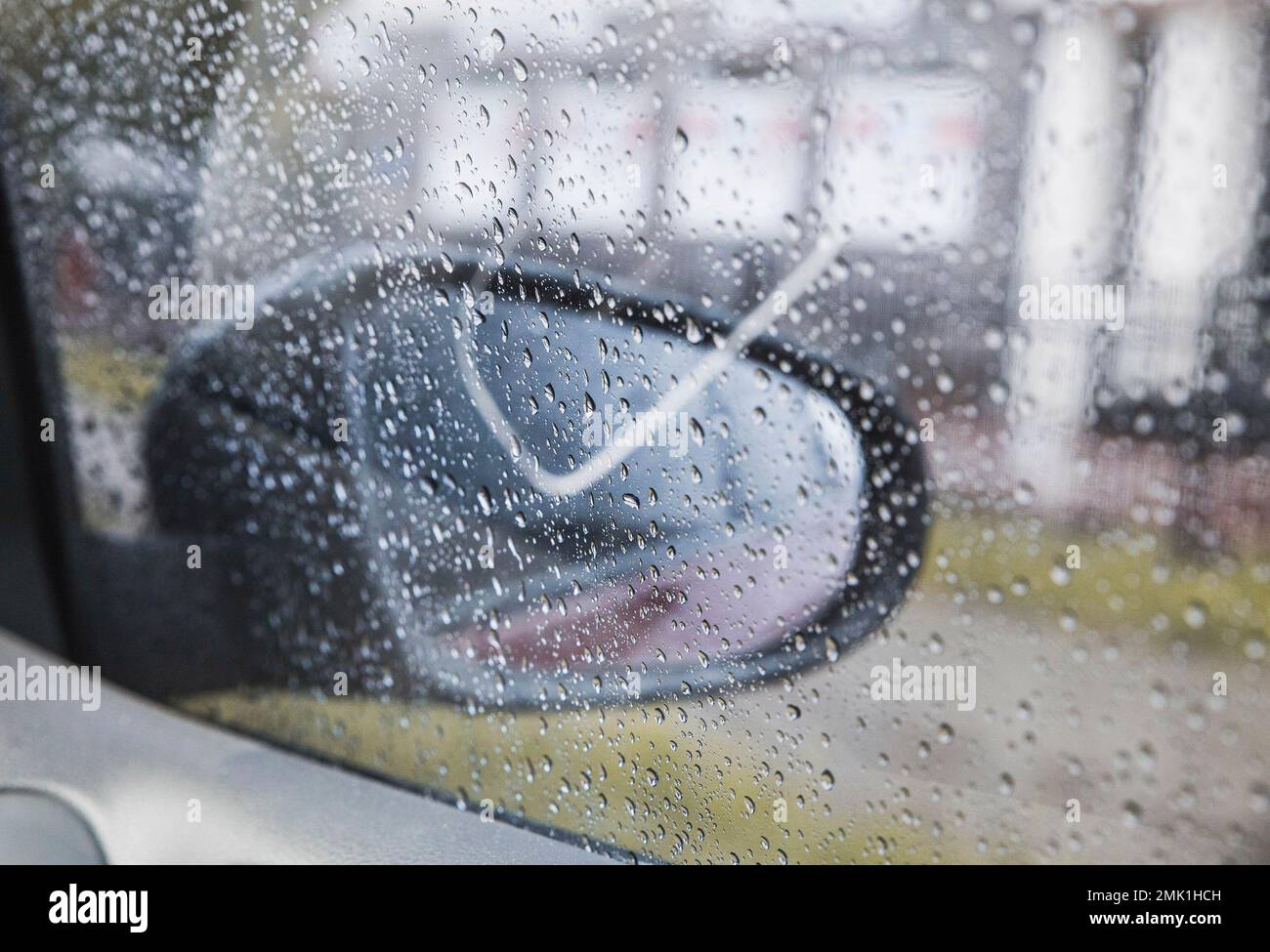 Raindrop on the window of the car Stock Photo - Alamy