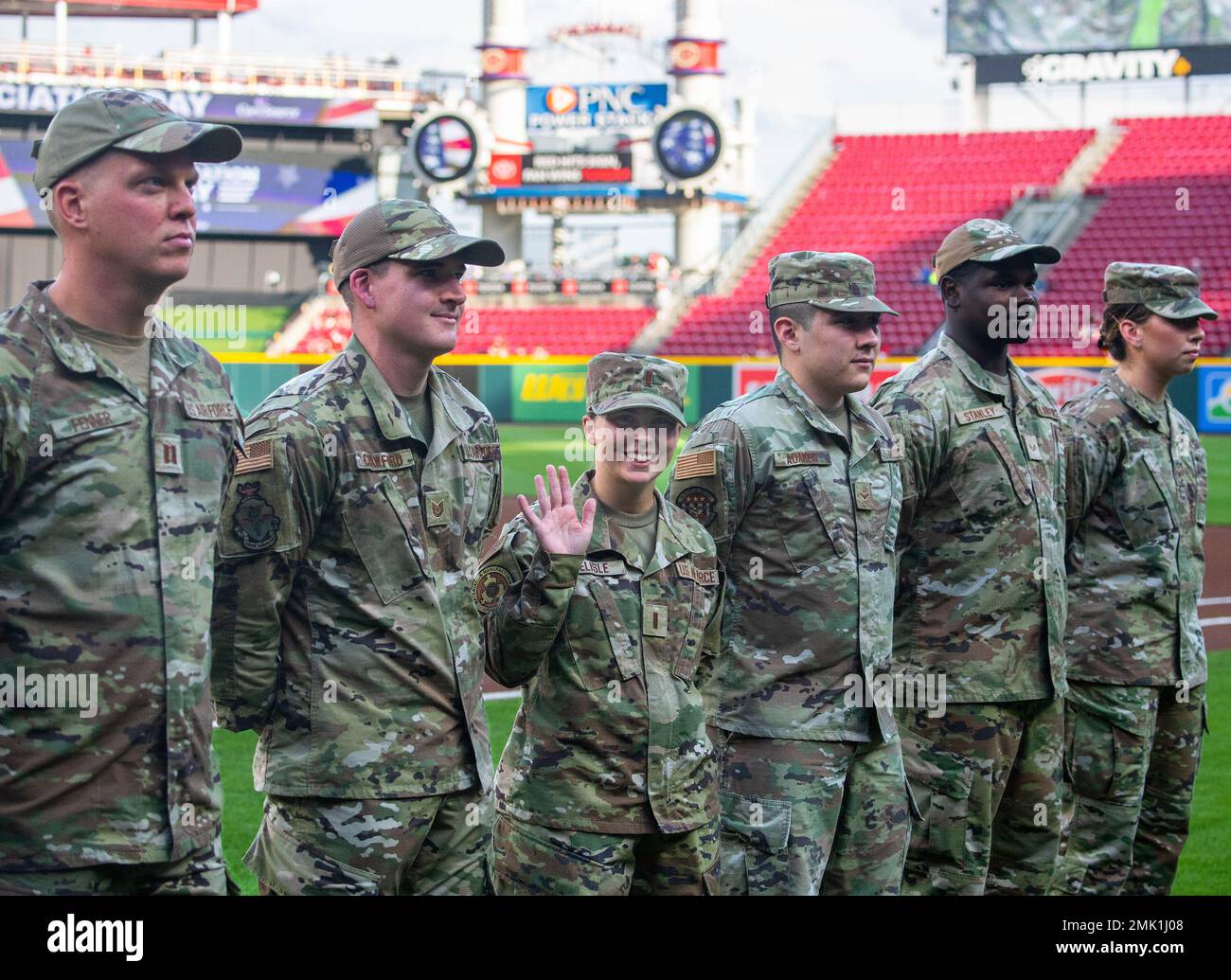 Second Lt. Evon Delisle, Air Force Research Laboratory, raises a hand ...