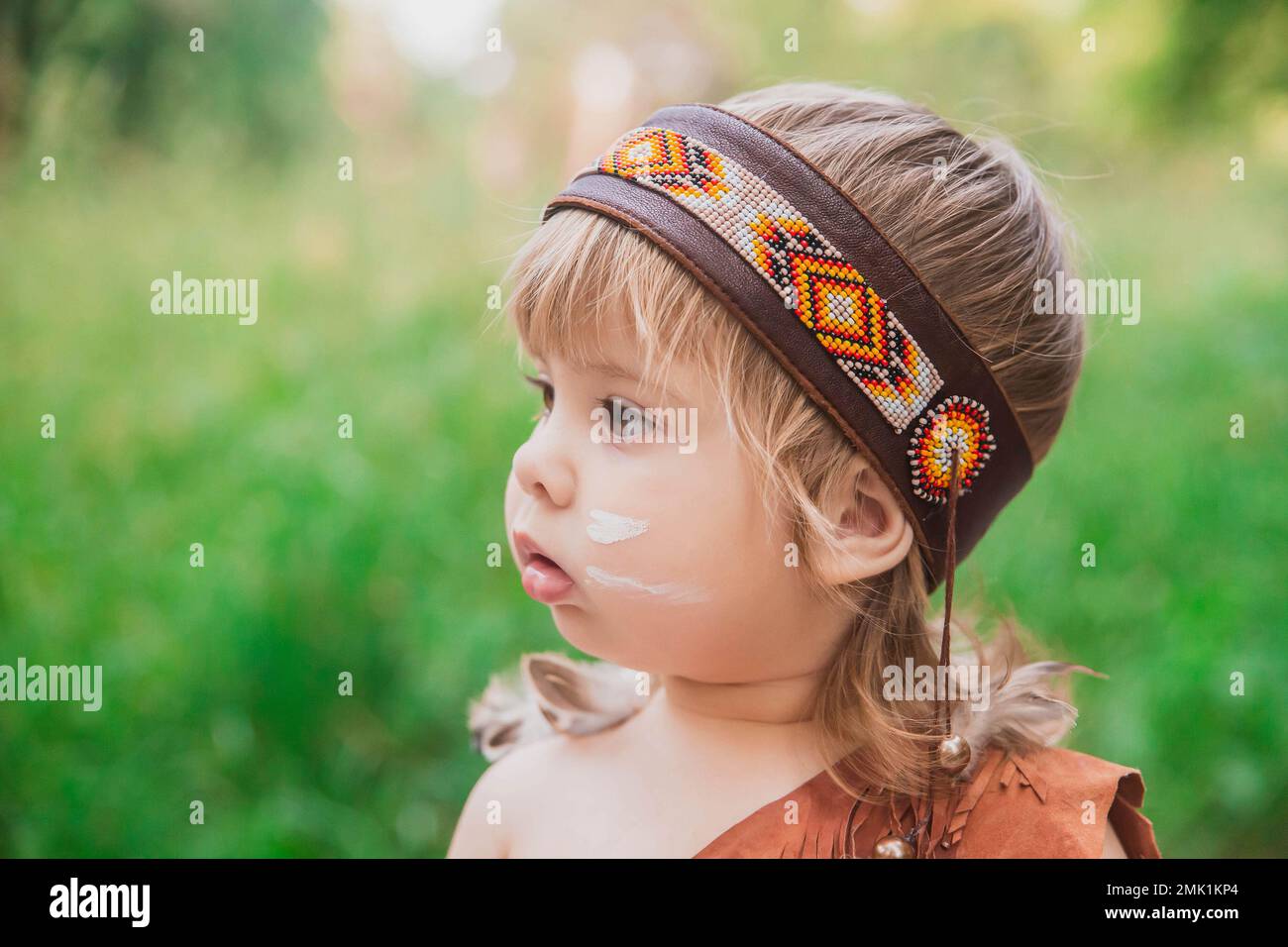 Cute baby dressed in traditional Native American costume Stock Photo ...