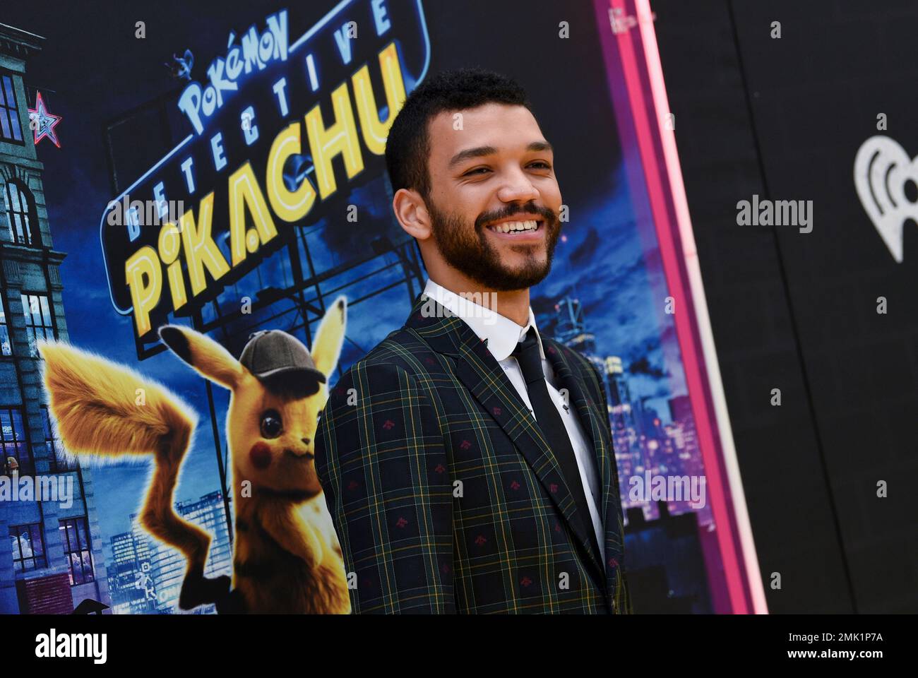 Actor Justice Smith attends the premiere of "Pokemon Detective Pikachu ...