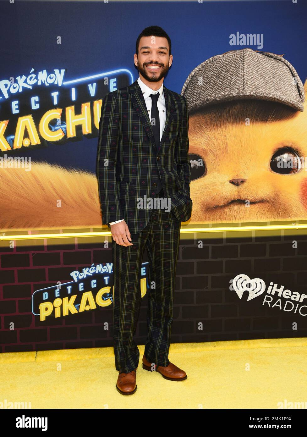 Actor Justice Smith attends the premiere of "Pokemon Detective Pikachu ...