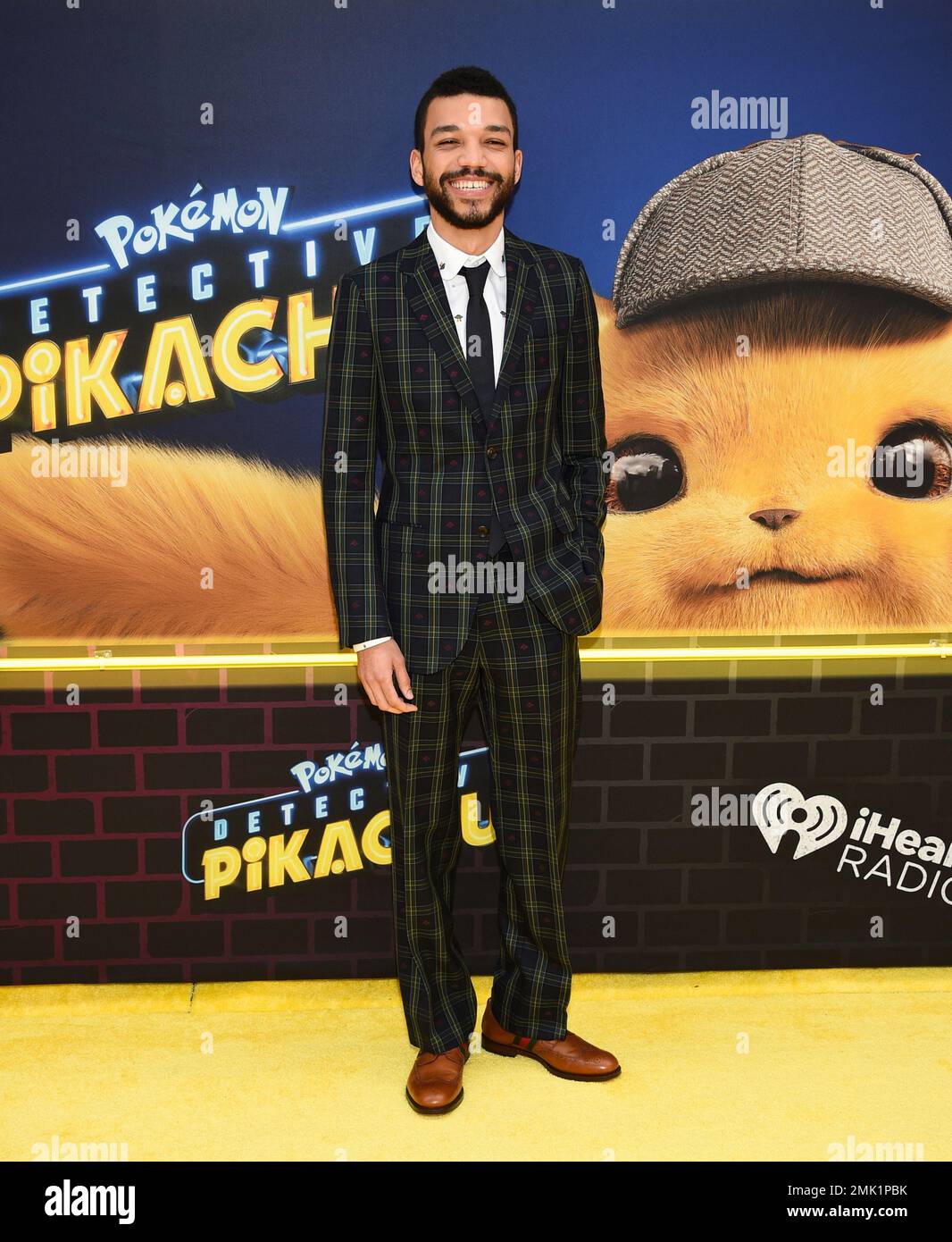Actor Justice Smith attends the premiere of "Pokemon Detective Pikachu ...
