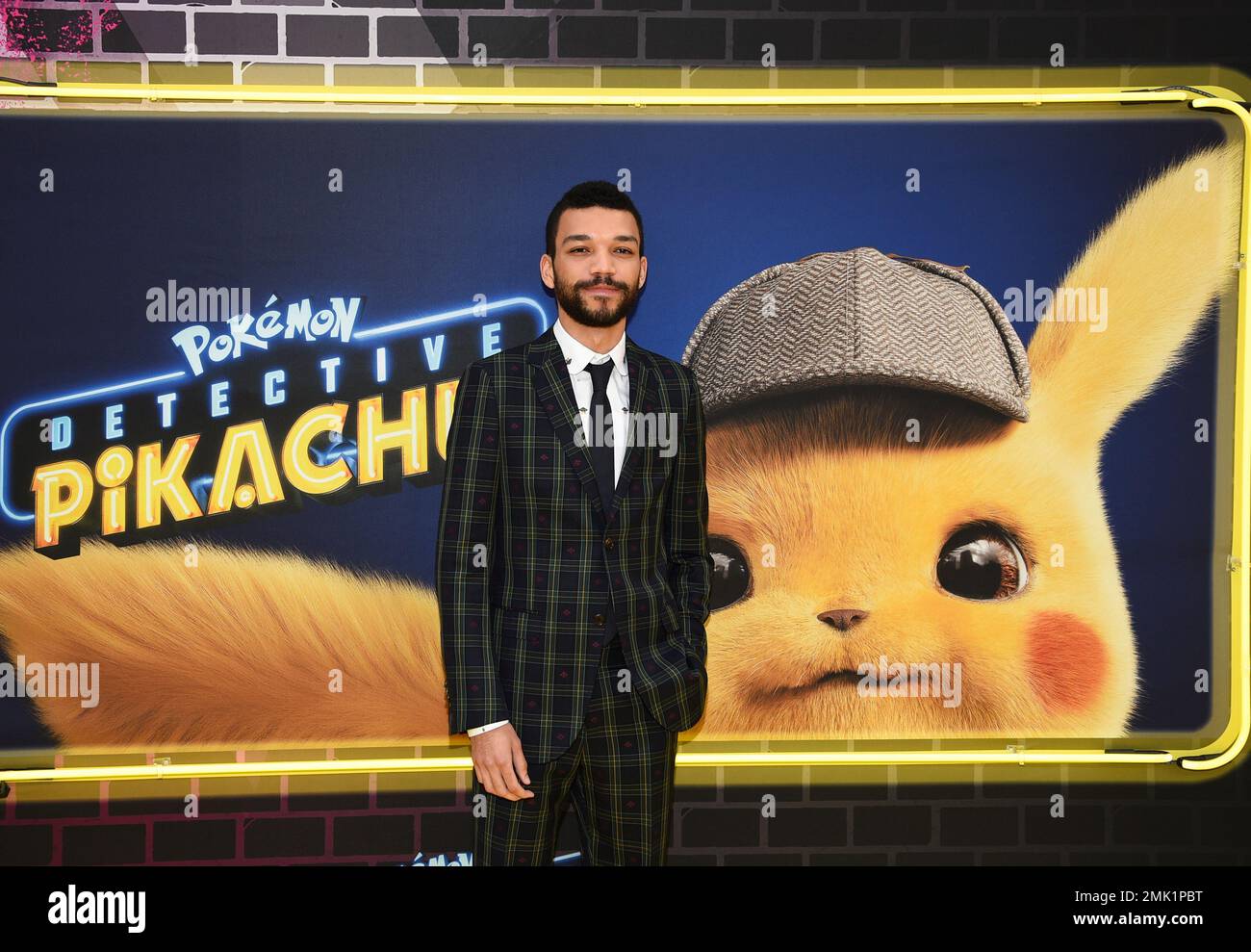 Actor Justice Smith attends the premiere of "Pokemon Detective Pikachu ...