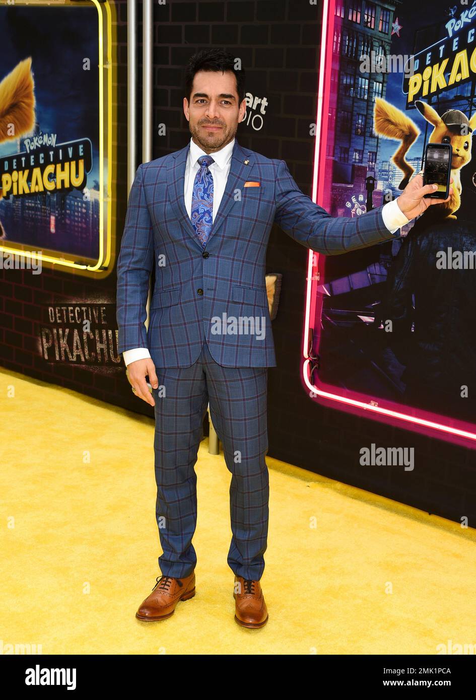 Actor Omar Chaparro attends the premiere of "Pokemon Detective Pikachu ...