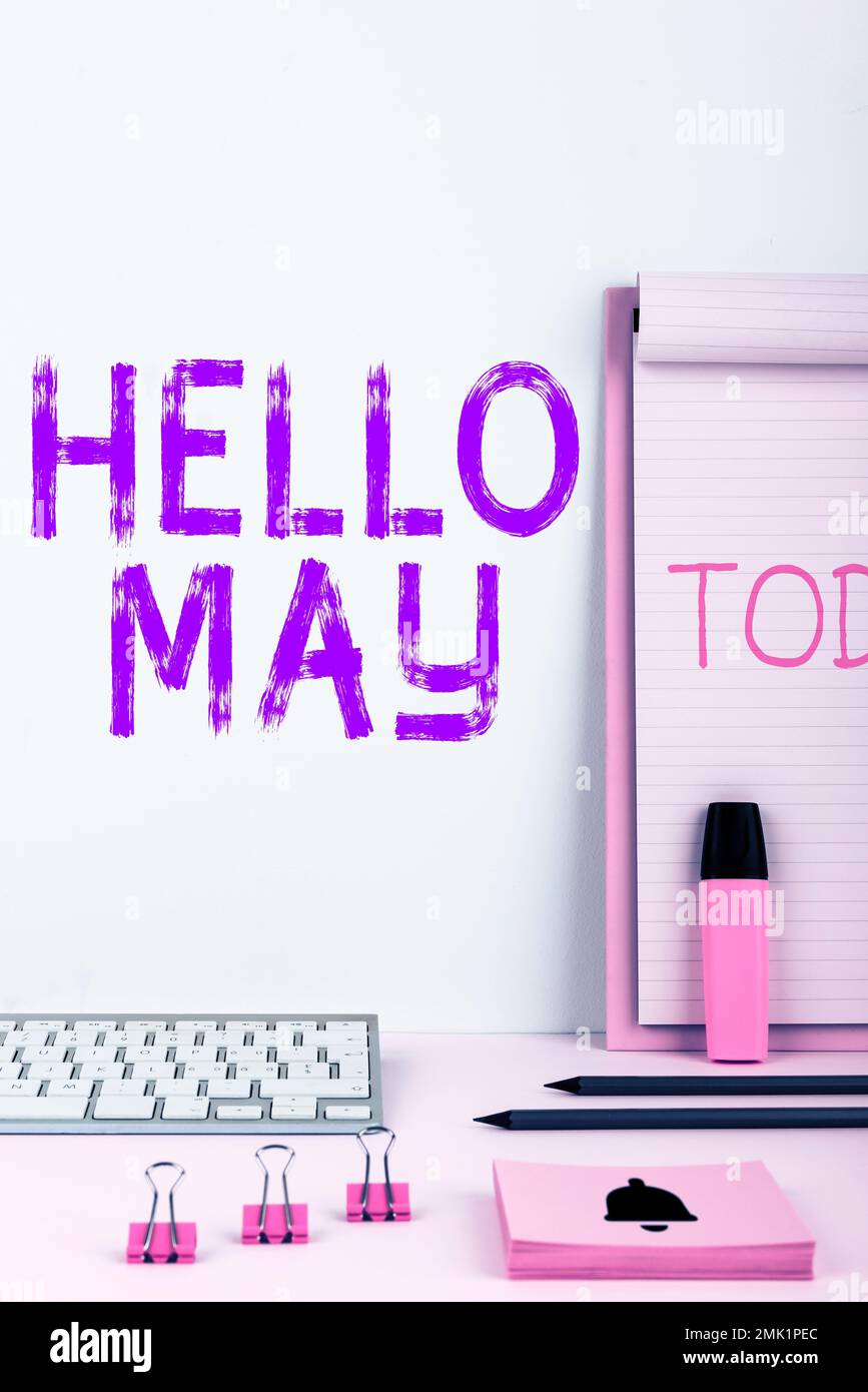Hand writing sign Hello May. Word Written on to address the fifth month ...