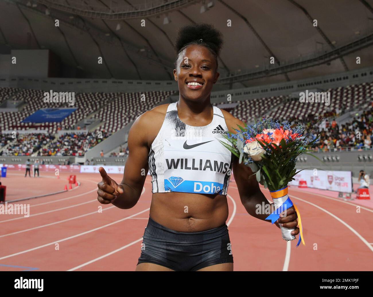 Jamaica's Danielle Williams celebrates winning the women's 100 meter ...