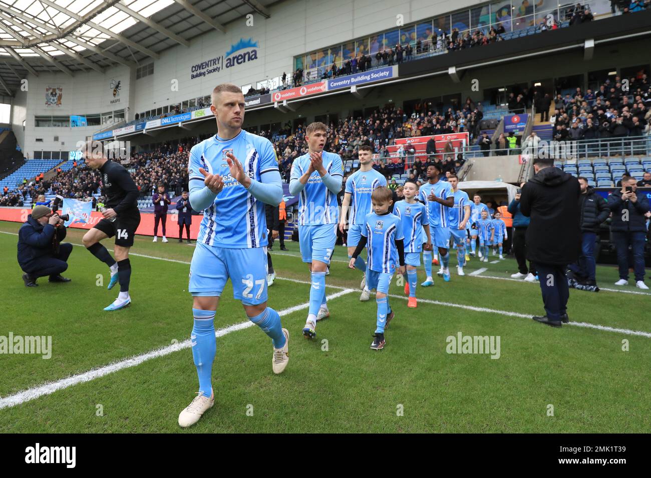 Coventry City's Jake Bidwell (3rd from left) applauds the fans before ...