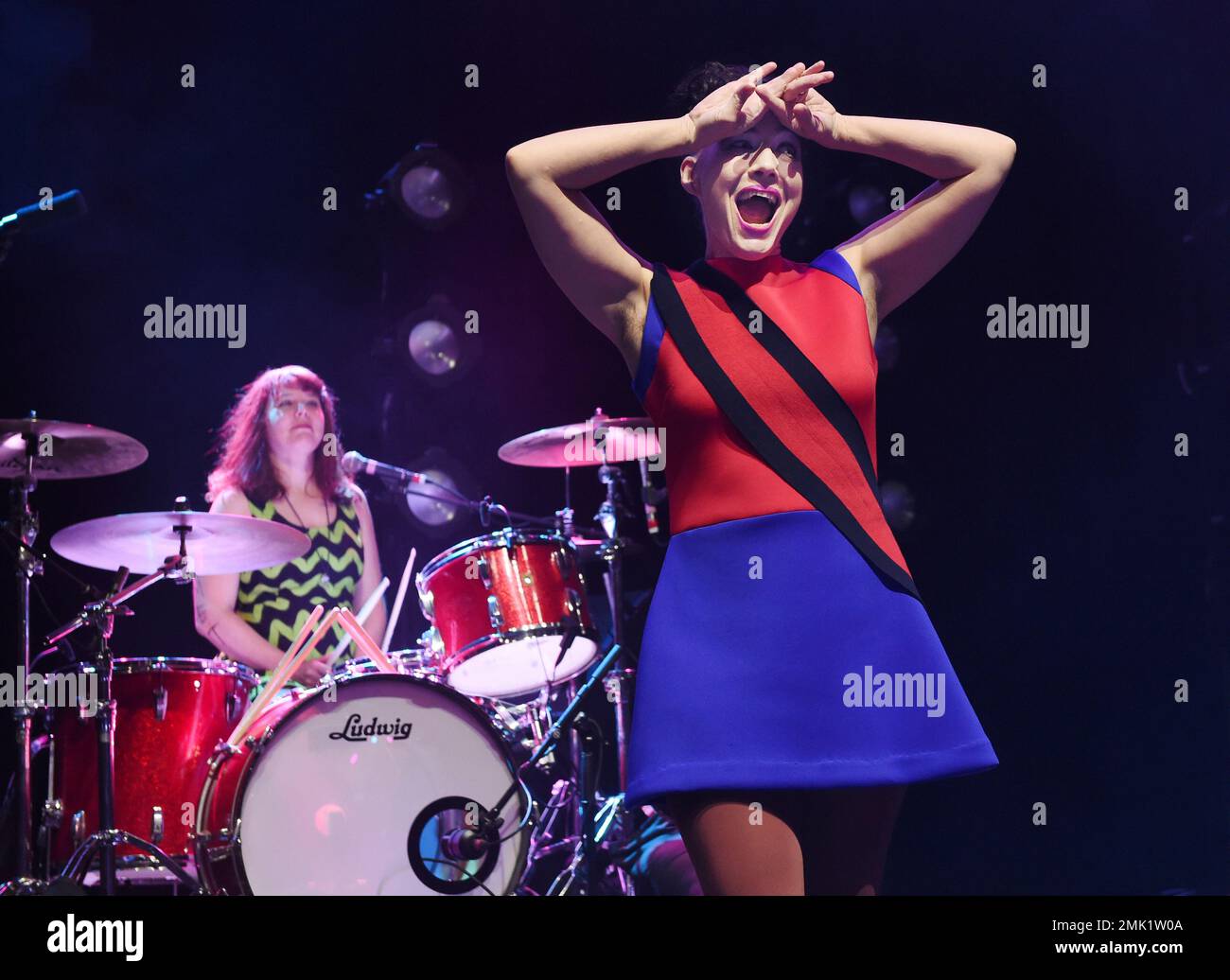 Kathleen Hanna, right, of the punk rock band Bikini Kill reacts to the ...