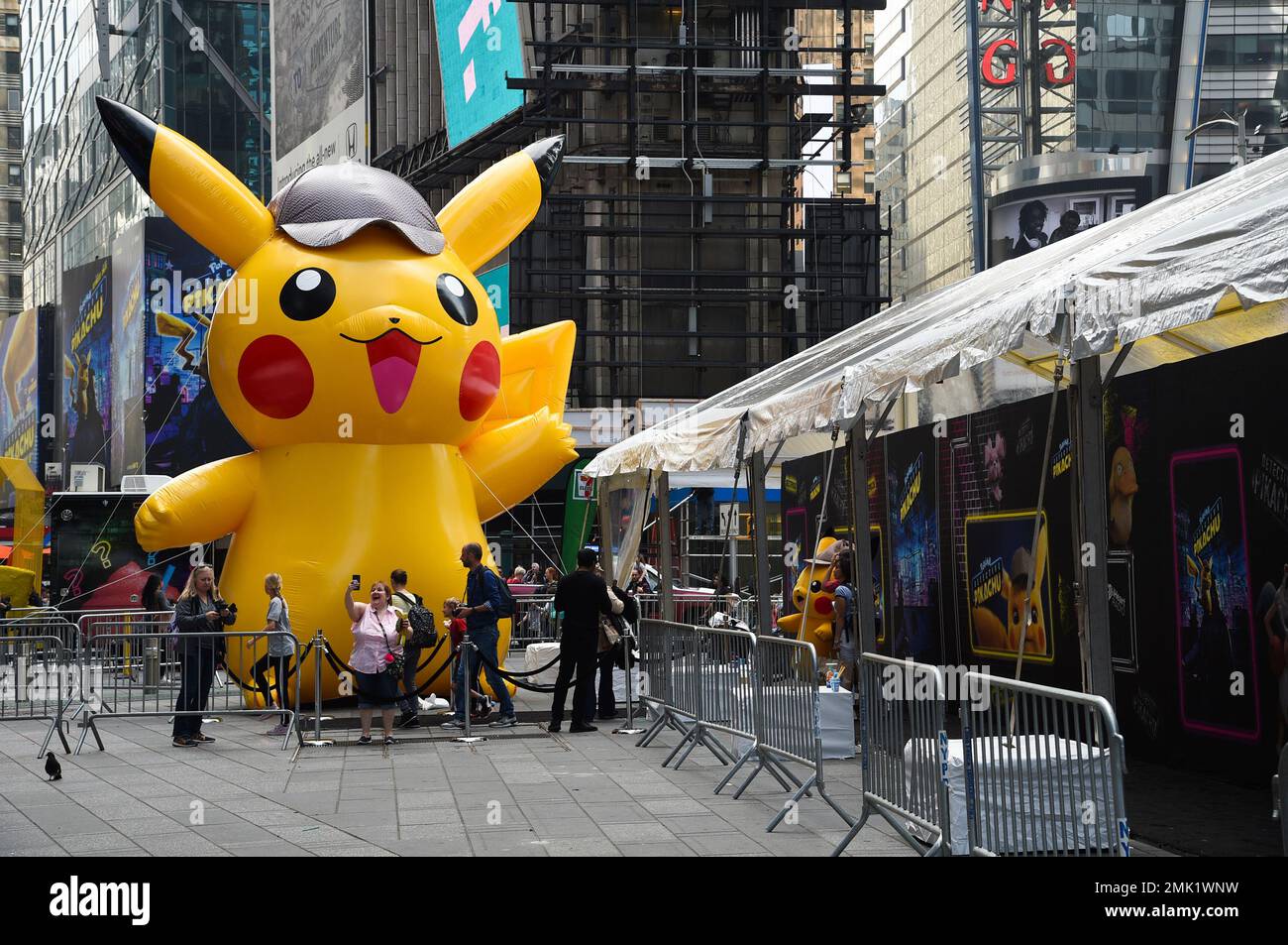 A giant Pikachu character sits outside the press tent for the premiere ...