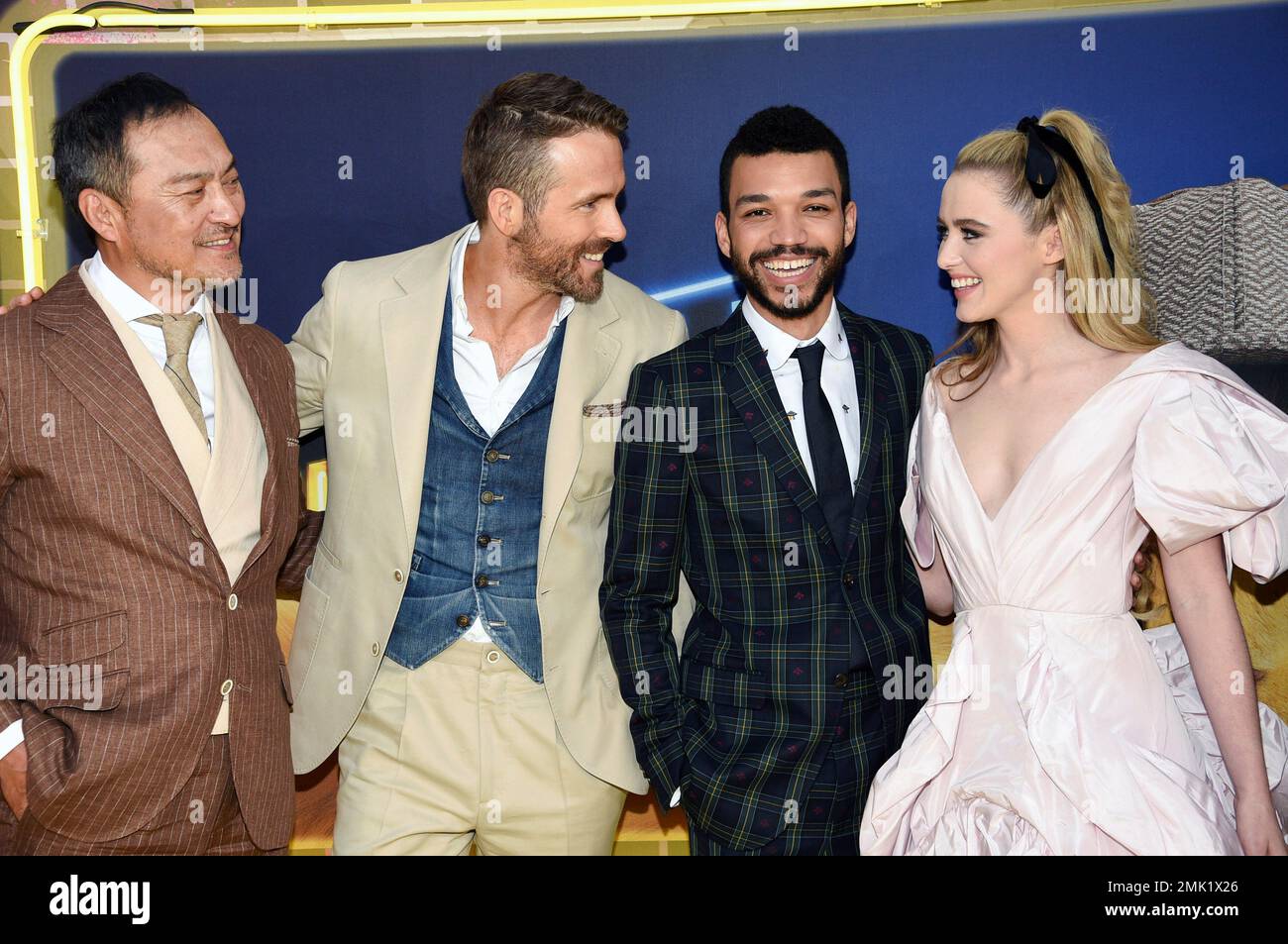Actors Ken Watanabe, left, Ryan Reynolds, Justice Smith, Kathryn Newton ...